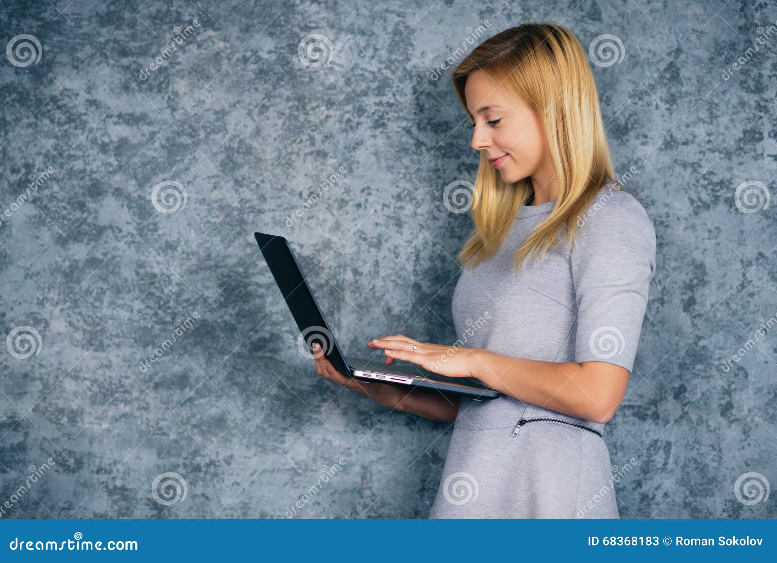 Beautiful Woman Standing with Laptop Computer Stock Image - Image of ...