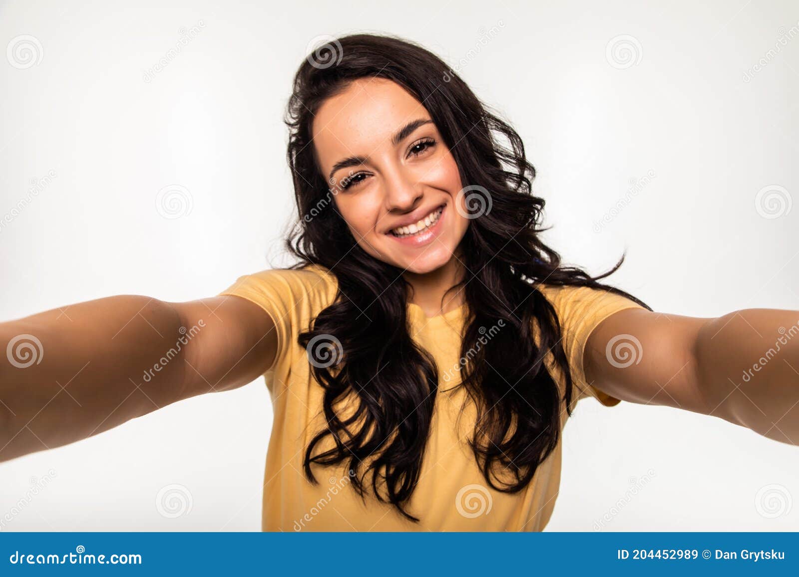 Beautiful Woman Taking Self Picture With Smartphone Camera On White