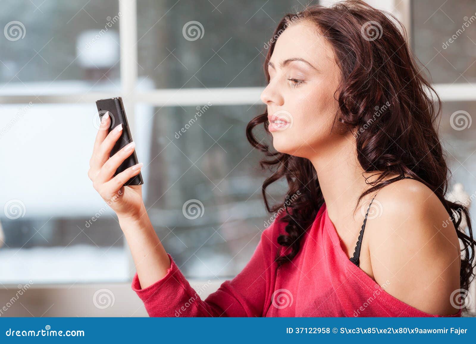 Beautiful Woman Texting with Her Phone Stock Photo - Image of inside ...