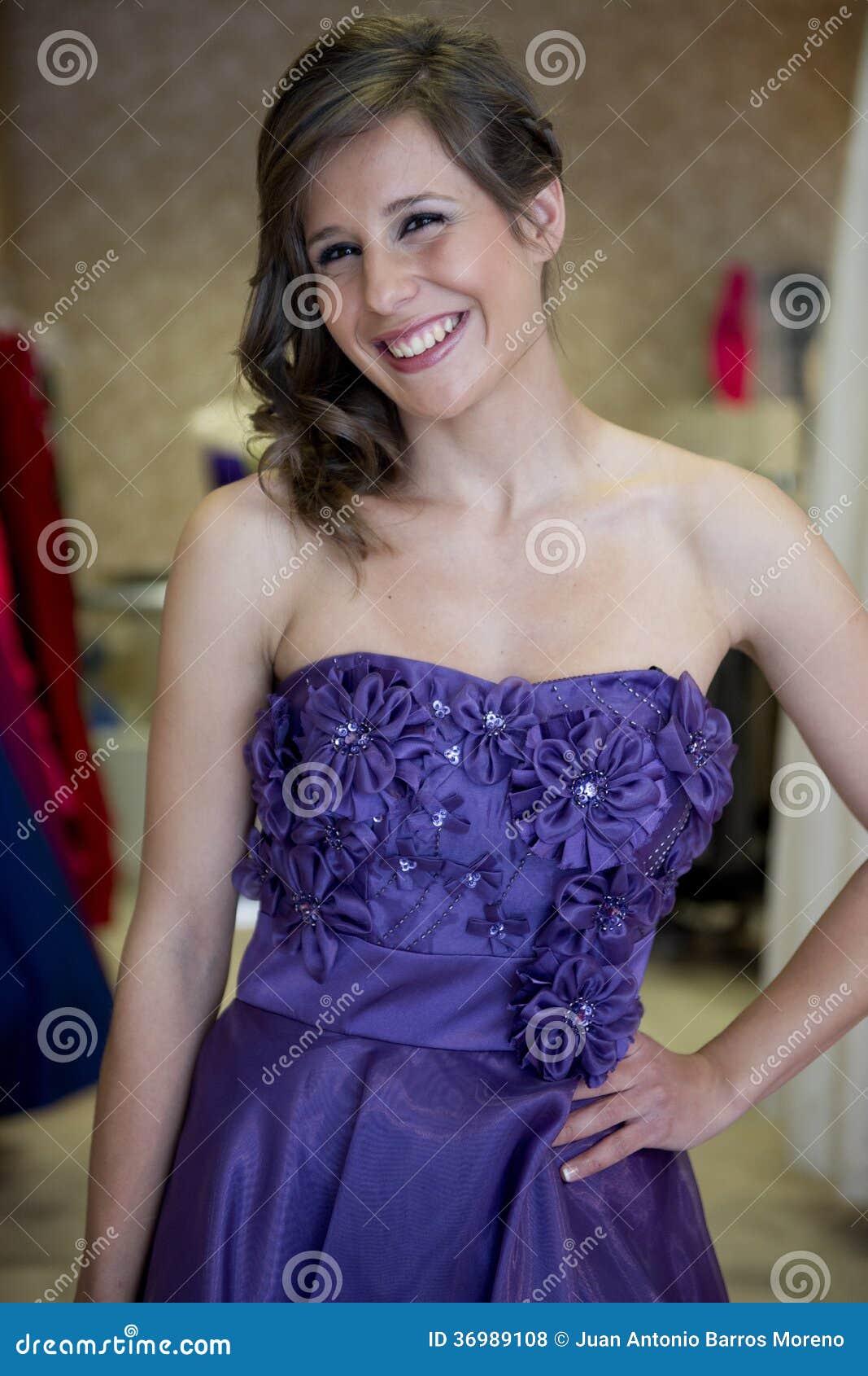 Beautiful Woman Try on a Dress Stock Photo - Image of beautiful, beauty ...