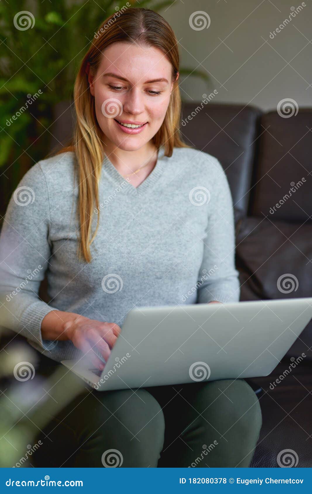 Beautiful Woman Using a Laptop Computer at Home Stock Photo - Image of ...