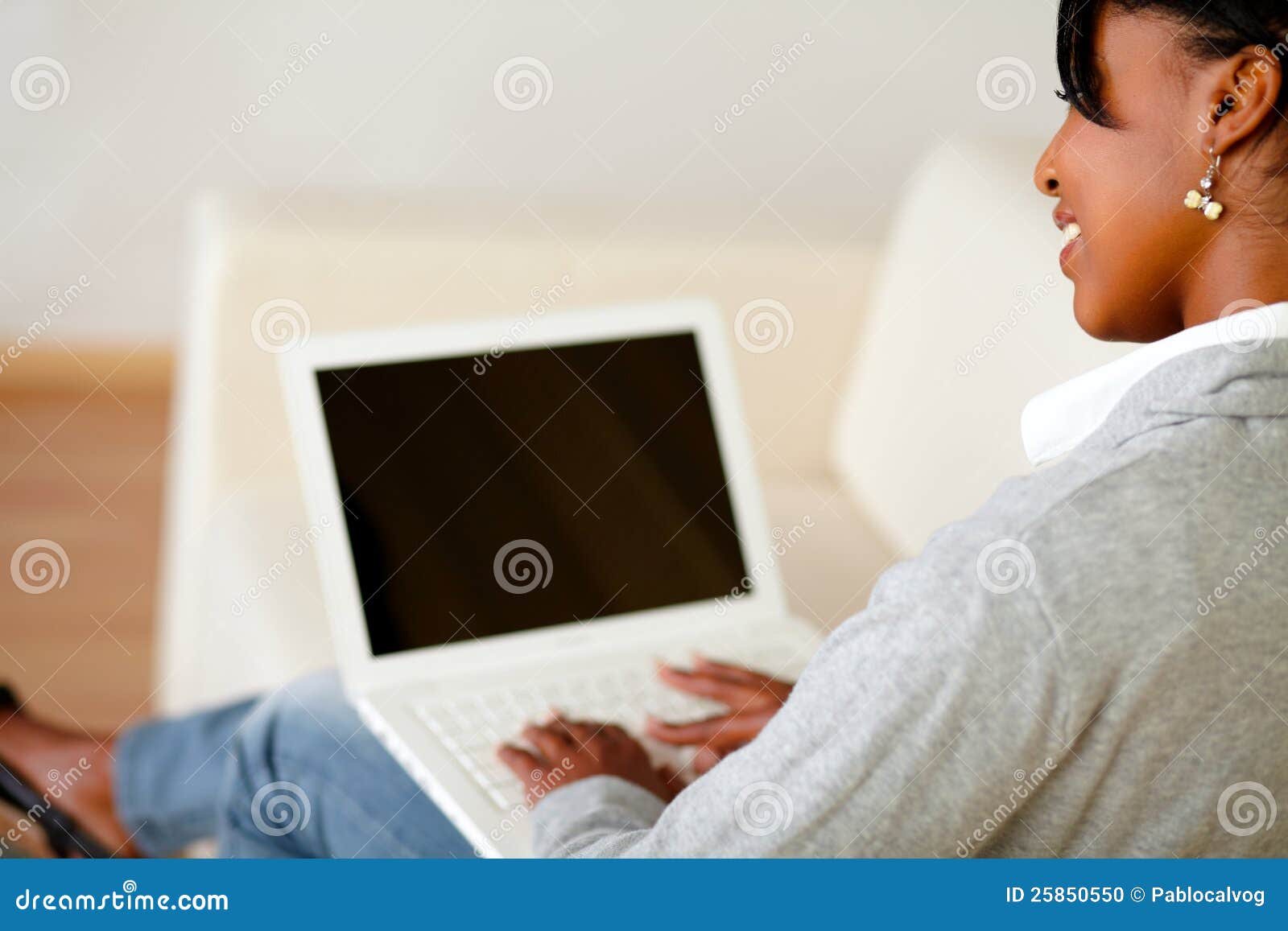 Beautiful Woman Using Laptop while is Sitting Stock Photo - Image of ...