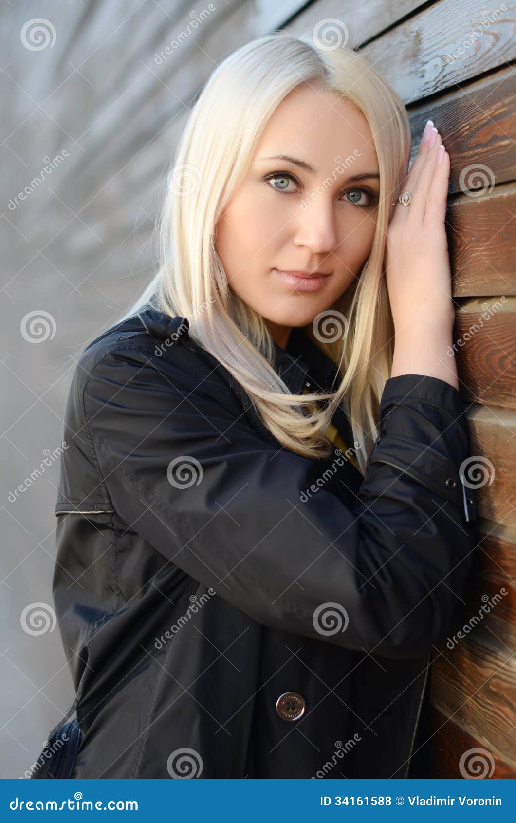 The Beautiful Woman at a Wall Stock Photo - Image of attractive, luxury ...