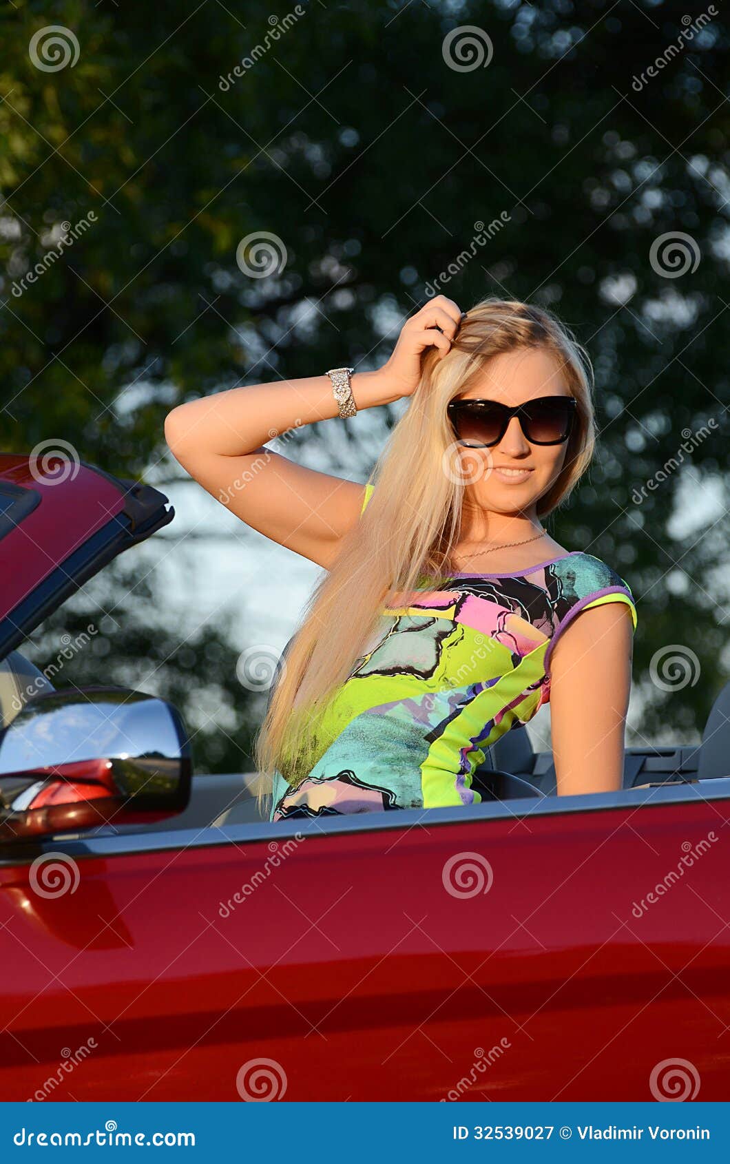The Beautiful Woman at the Wheel the Red Car Stock Image - Image of ...