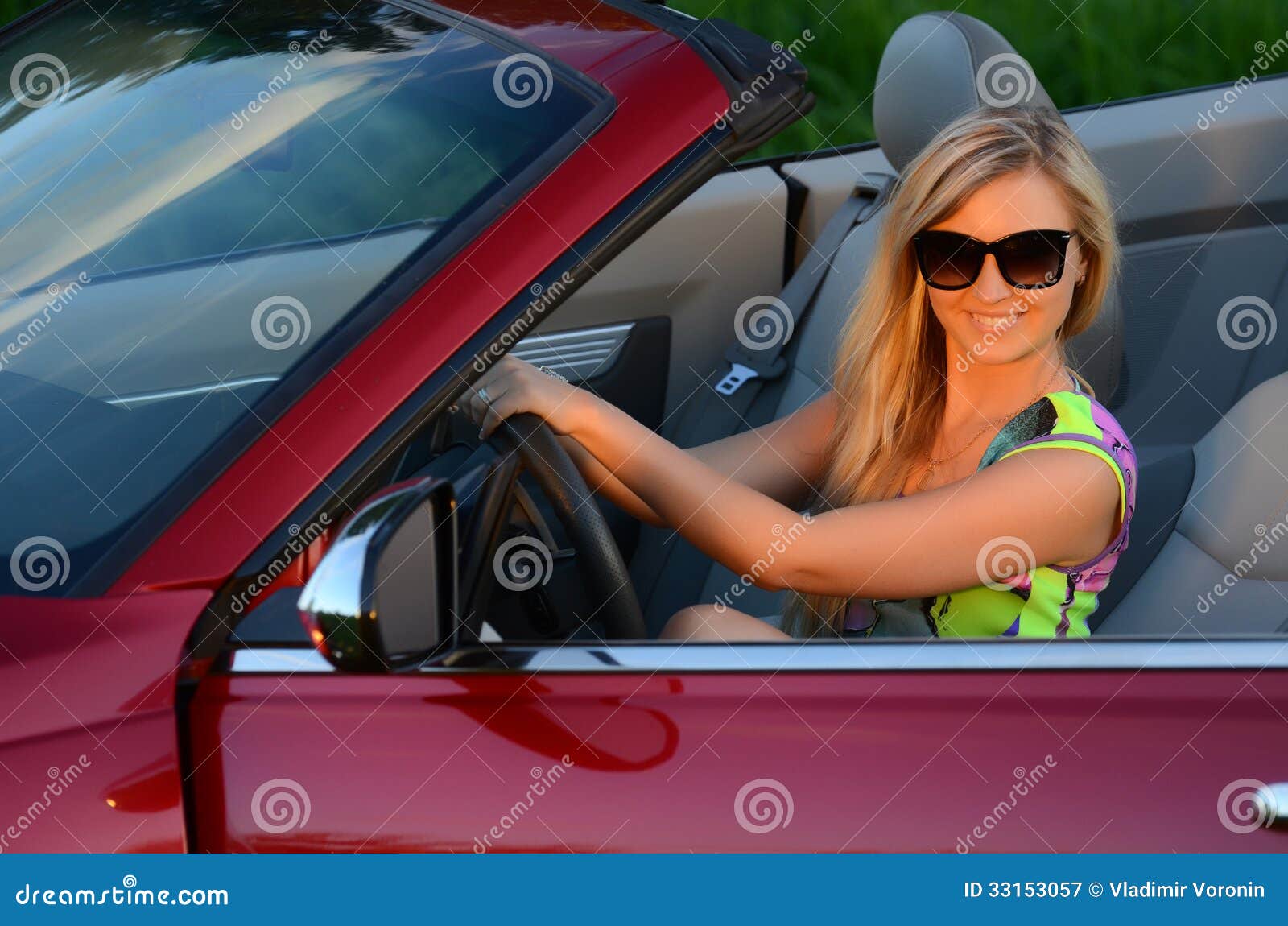 The Beautiful Woman at the Wheel the Red Car Stock Image - Image of ...