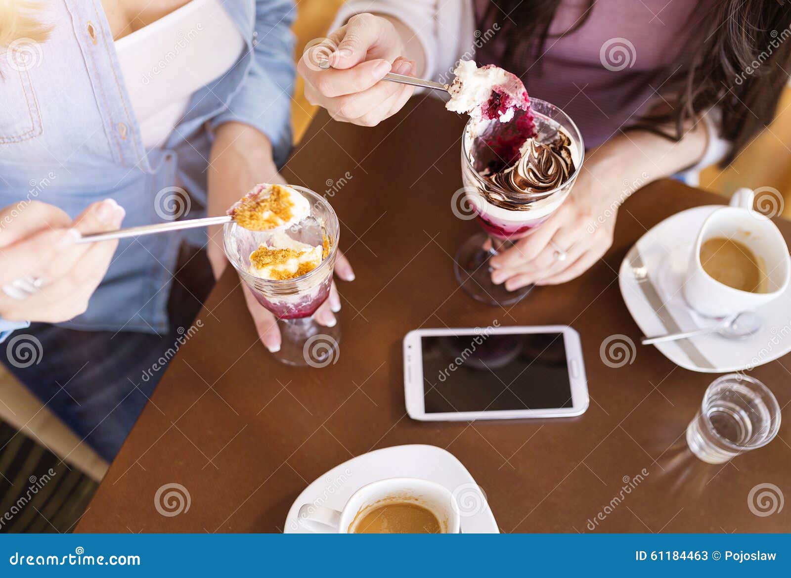 Beautiful women in cafe stock image. Image of drinking - 61184463