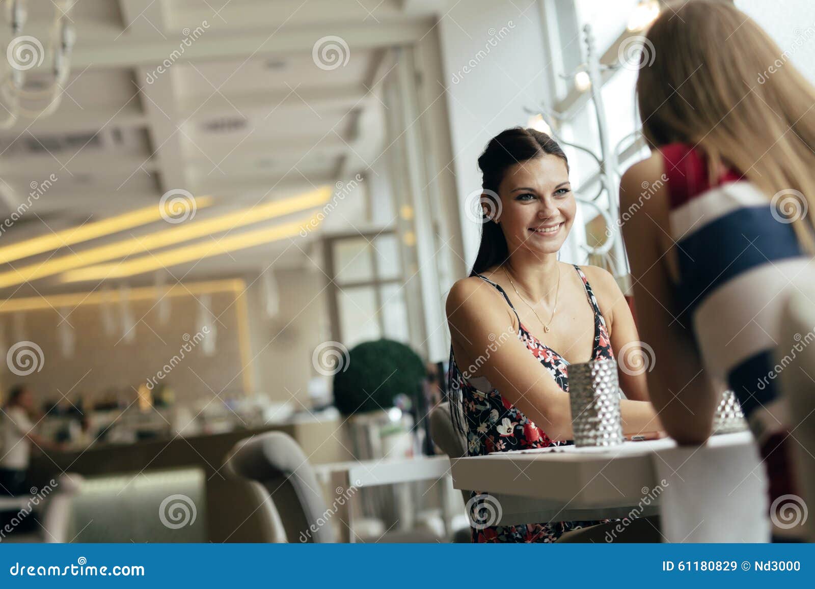 Beautiful Women Talking in Restaurant Stock Image - Image of urban ...