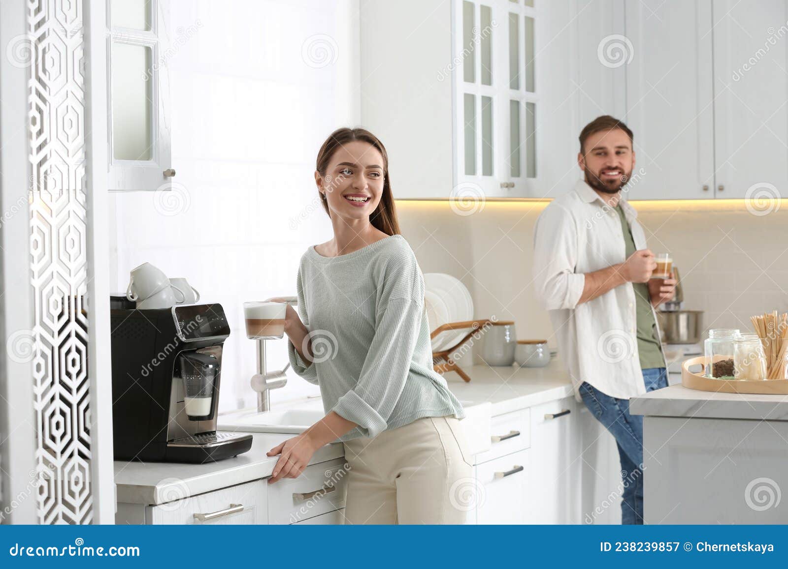Beautiful Young Woman Using Modern Coffee Machine in Kitchen Stock ...