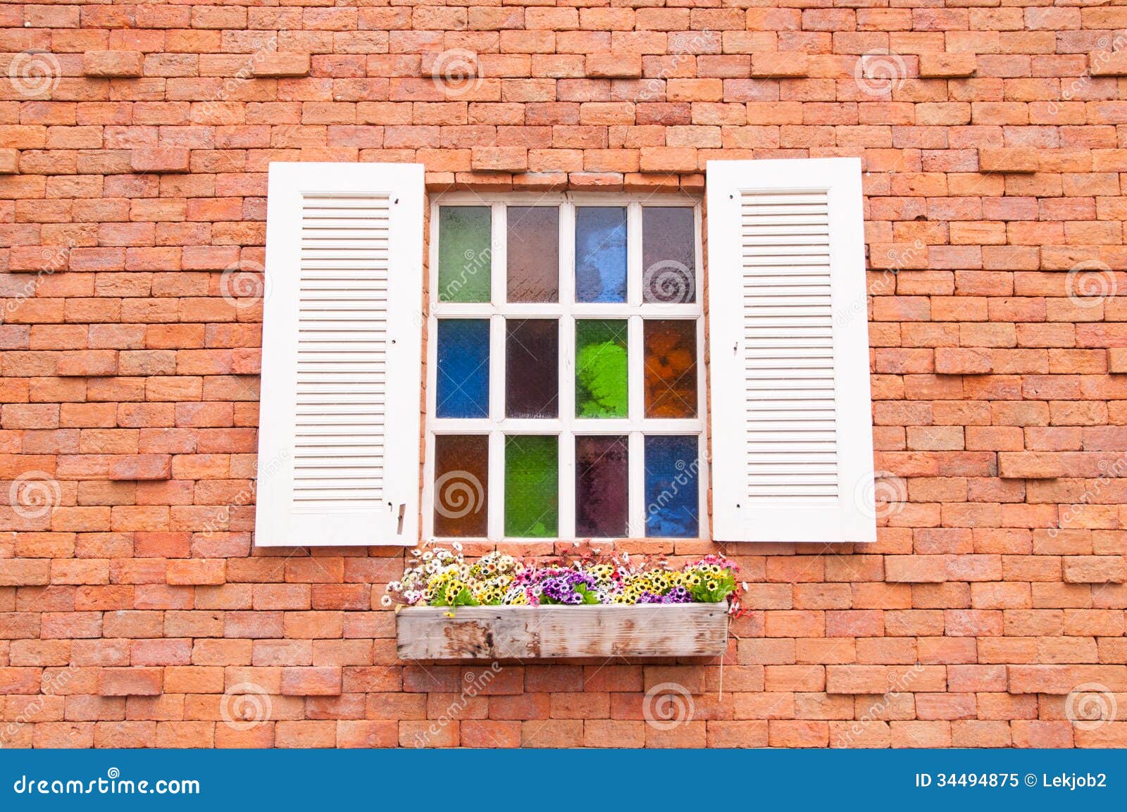Beautiful Wood Window with Multi Color Glass and Brick Wall Stock Image ...