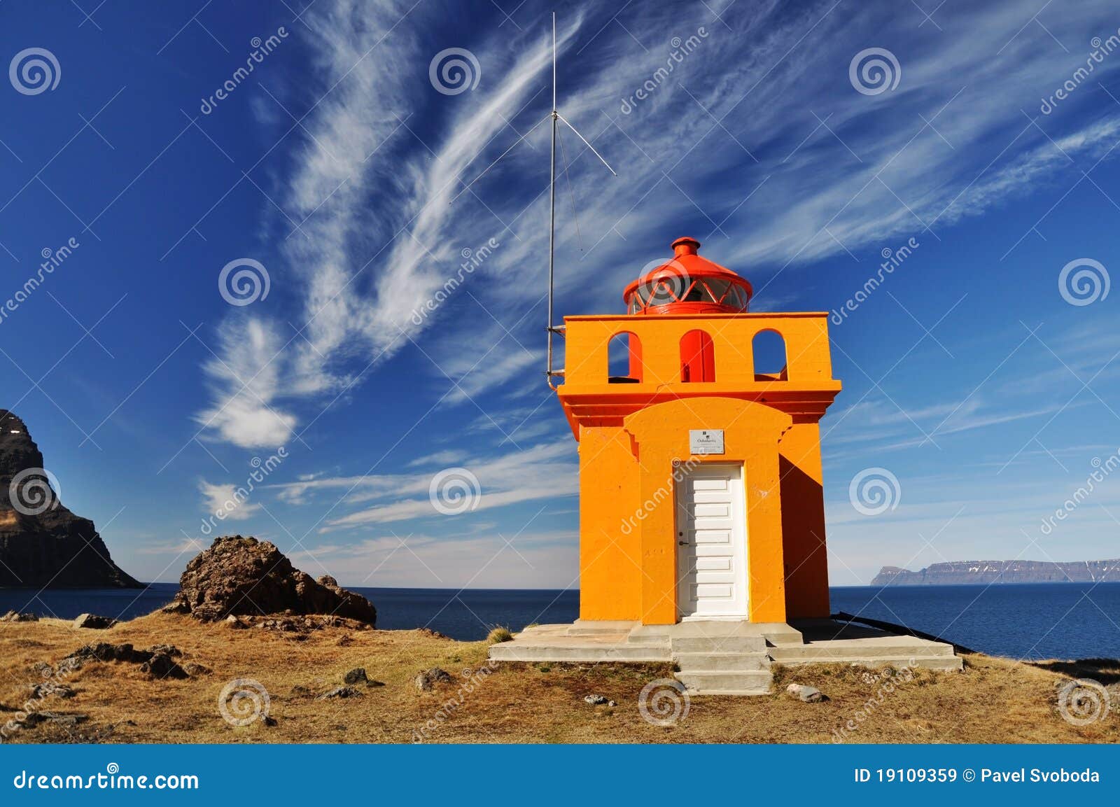 The Yellow And Red Lighthouse Of Pilsum With Dark Clouds In The ...