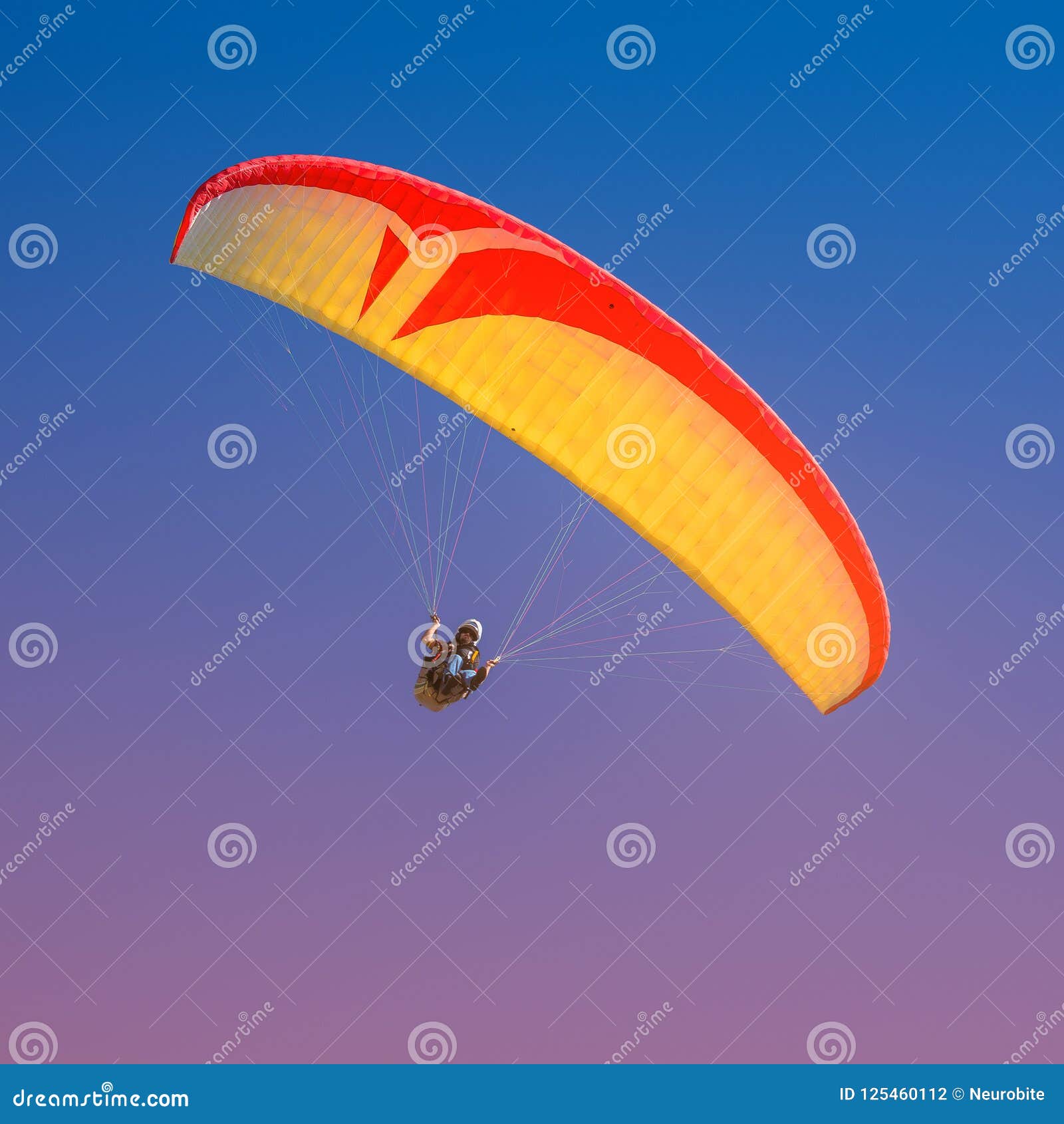 Beautiful Yellow and Red Paraglider Flying in Colorful Sky Editorial ...