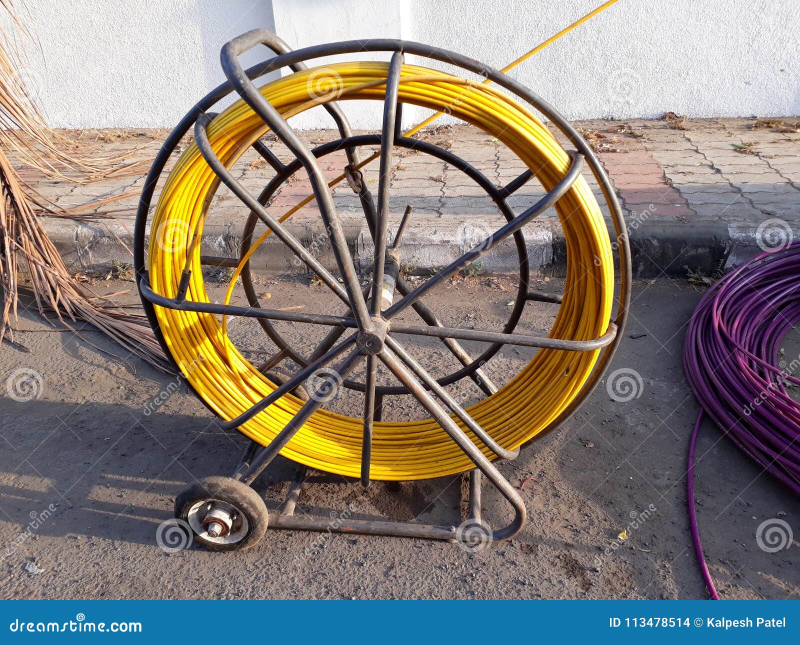 Yellow Wire Lying on the Road Stock Photo - Image of worked, news ...