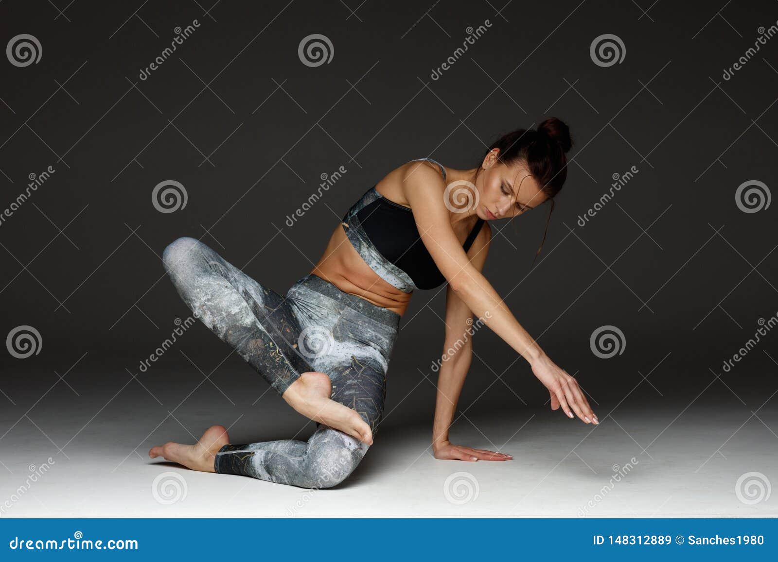 Young Beautiful Yoga Instructor is Posing in Studio. Stock Image ...