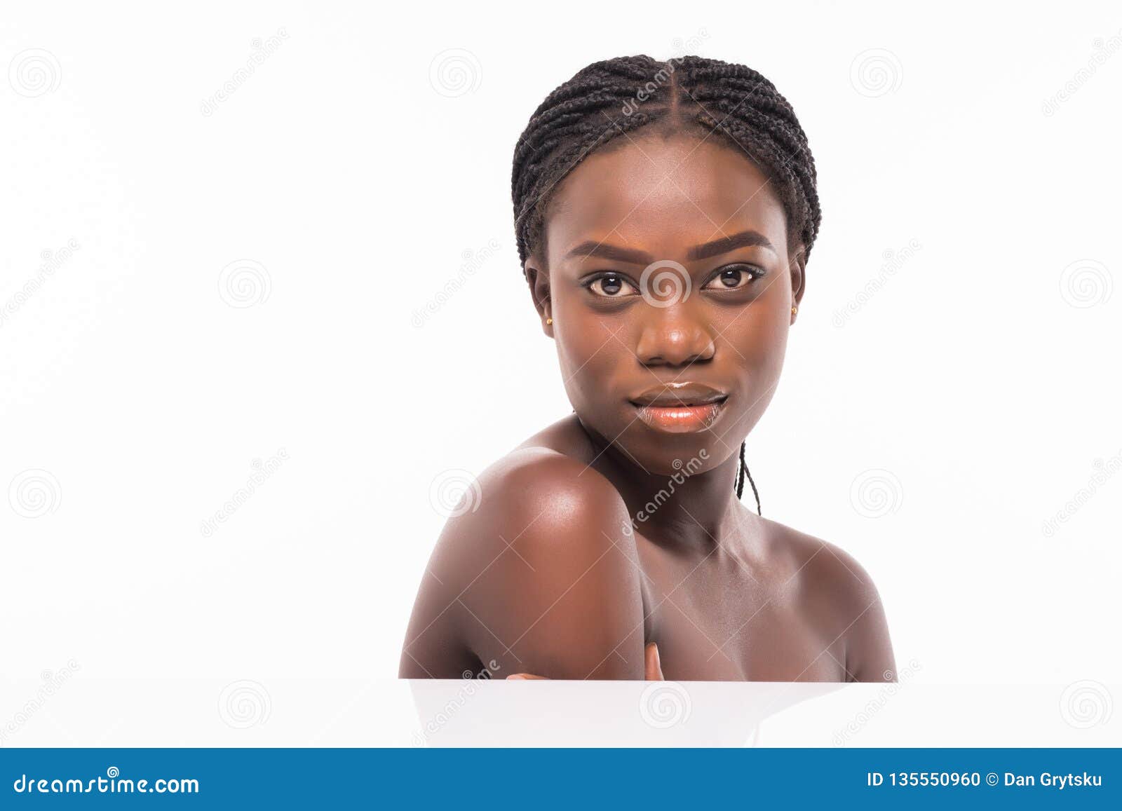 Beautiful Young African Female Touching Her Skin Isolated On White