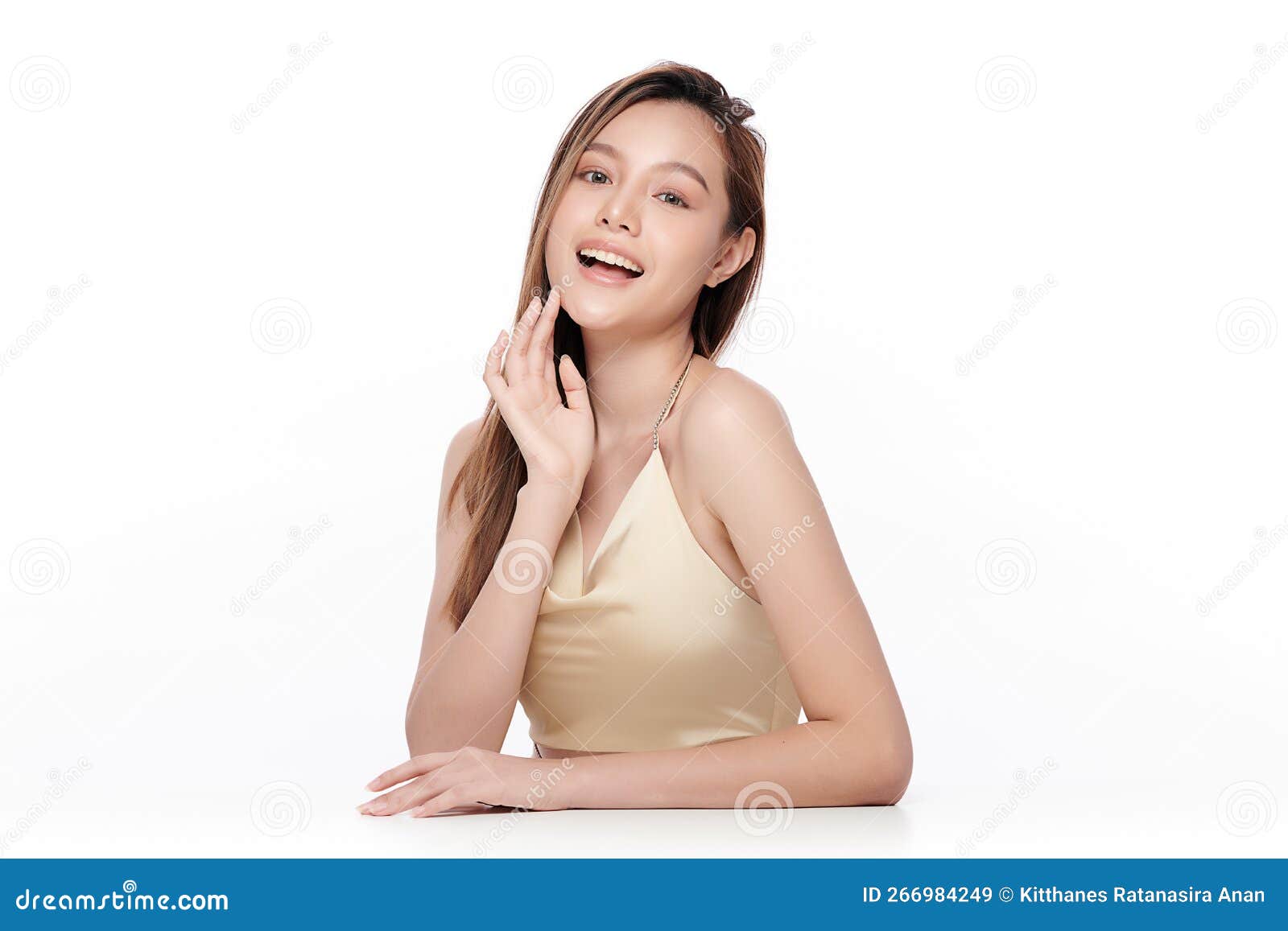 Beautiful Young Asian Woman With Clean Fresh Skin On White Background