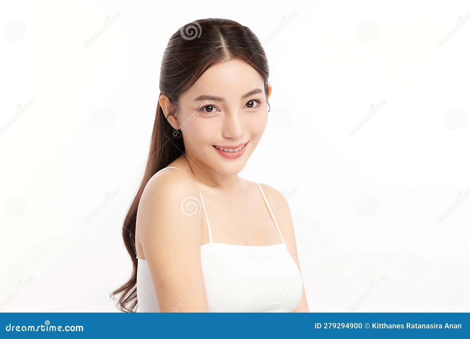 Beautiful Young Asian Woman With Clean Fresh Skin On White Background