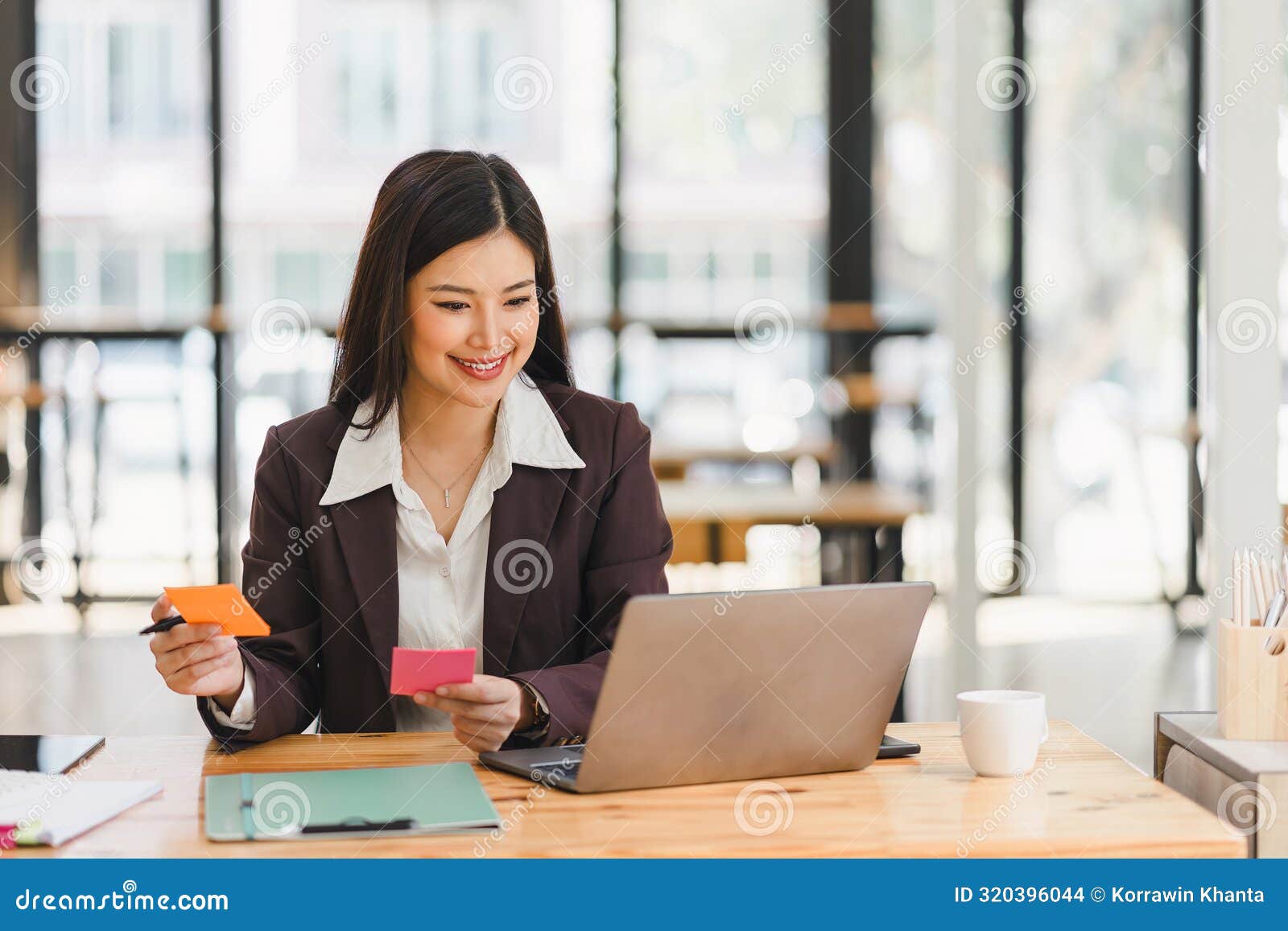 Beautiful Young Asian Woman Hand Taking Notes on Sticky Note at Modern ...