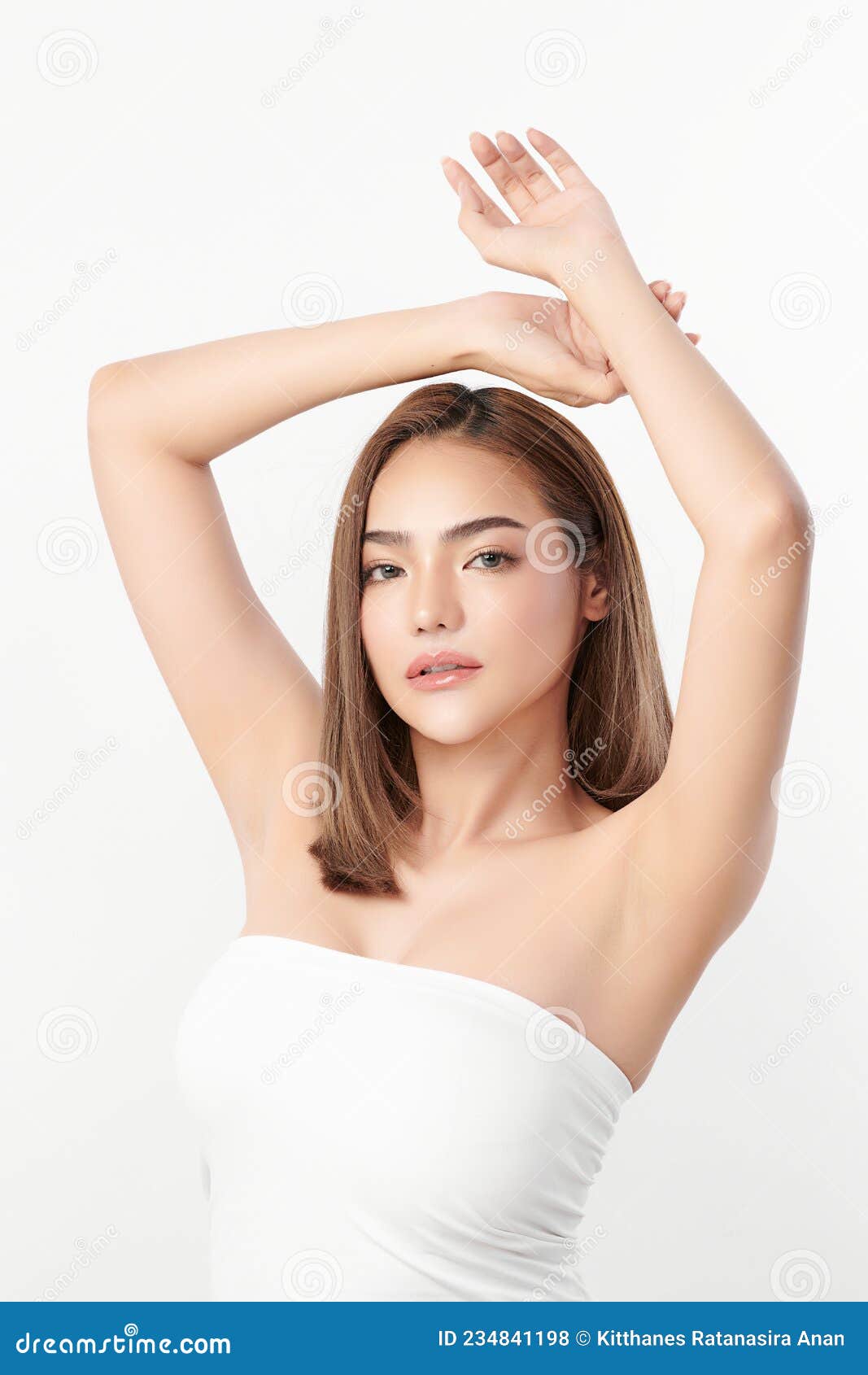 Beautiful Young Asian Woman Lifting Hands Up To Show Off Clean And