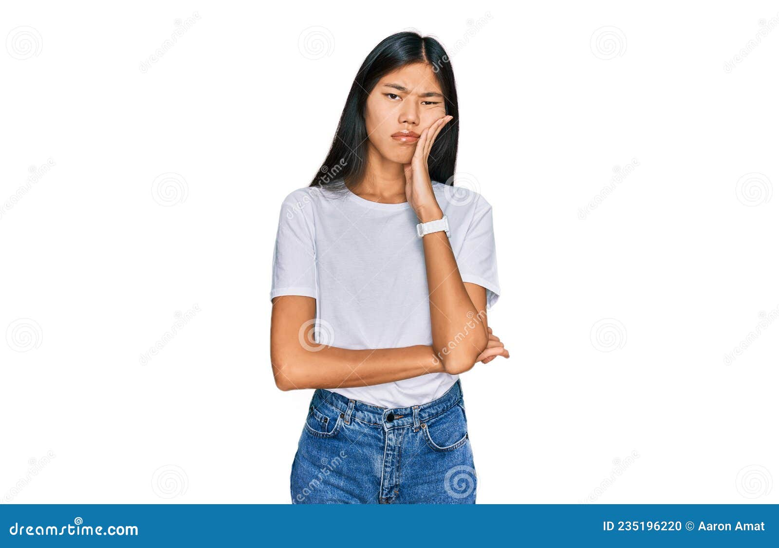 Beautiful Young Asian Woman Wearing Casual White T Shirt Thinking