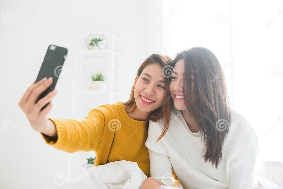 Beautiful Young Asian Women Lgbt Lesbian Happy Couple Sitting On Bed