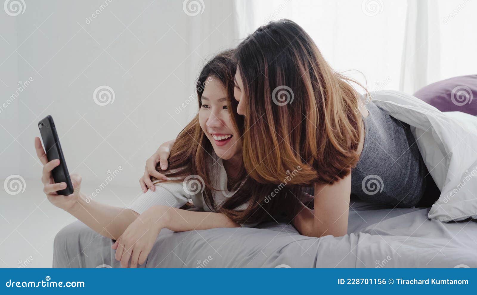 Beautiful Young Asian Women Lgbt Lesbian Happy Couple Sitting On Bed