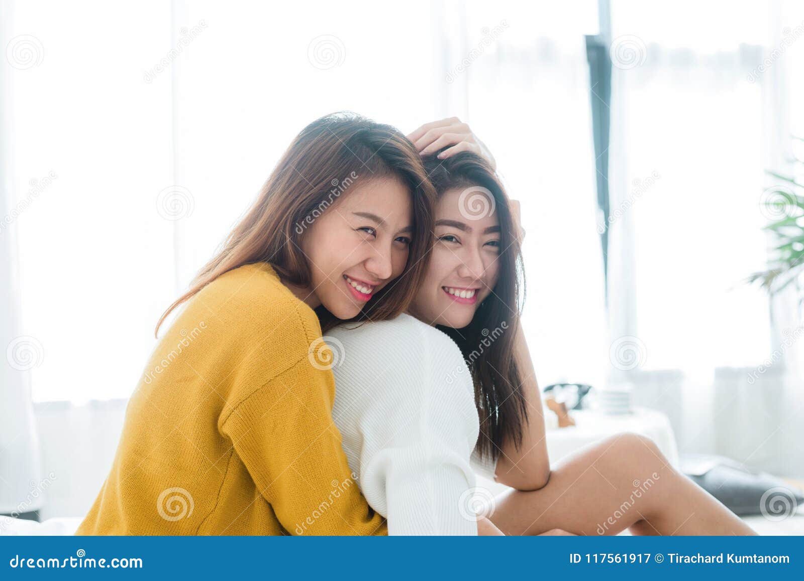 Beautiful Young Asian Women Lgbt Lesbian Happy Couple Sitting On Bed