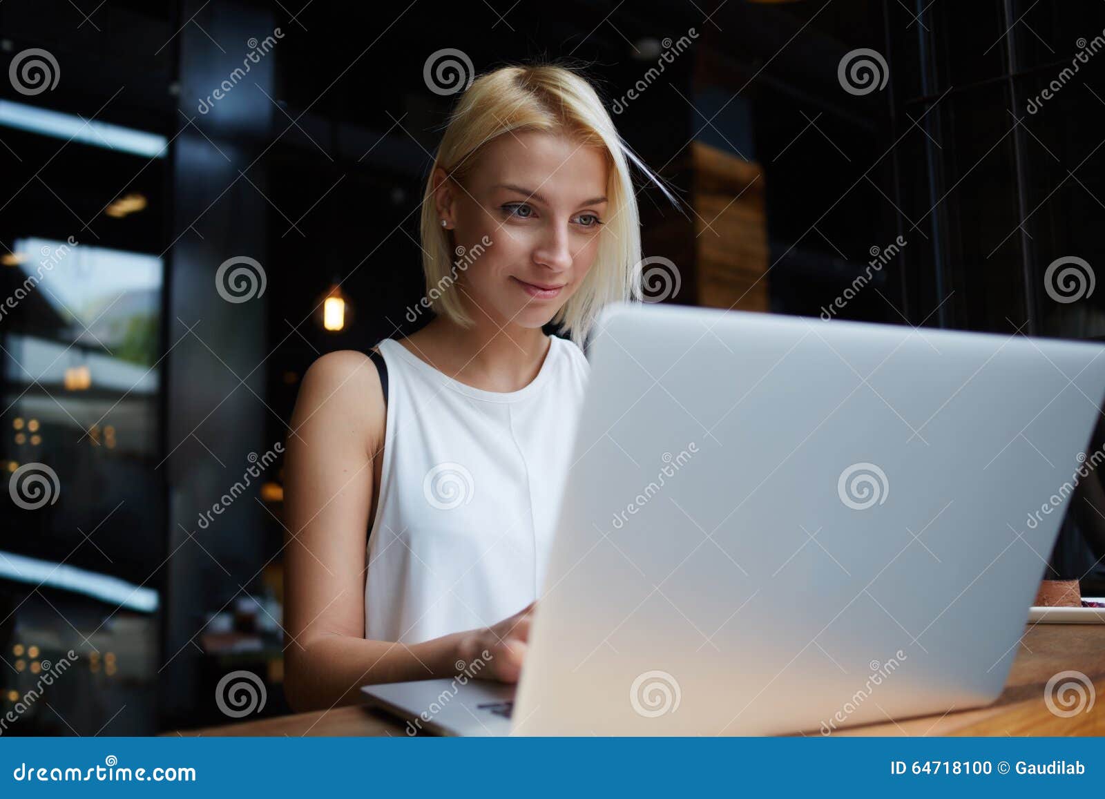 Beautiful Young Blonde Female Student Using Portable Laptop Computer ...