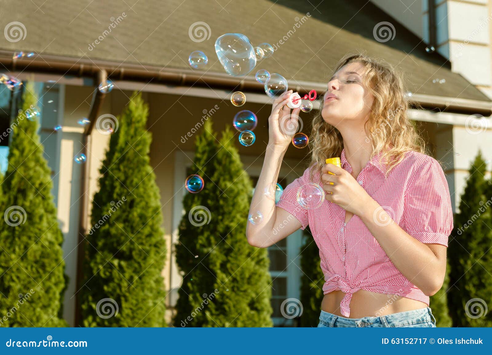Beautiful Young Blonde Girl Blowing Soap Bubbles Stock Image Image Of