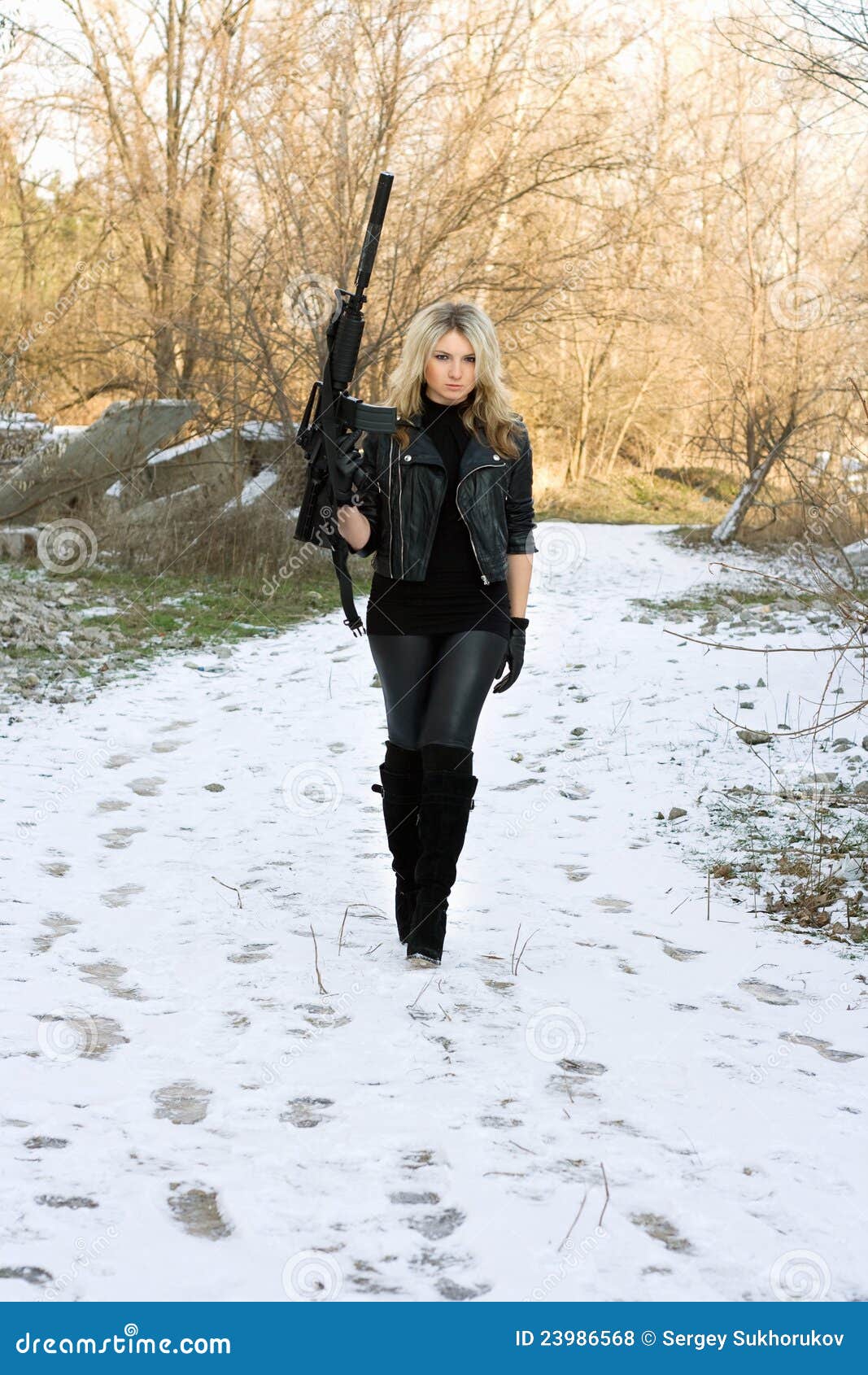 Beautiful Young Blonde with a Gun Stock Photo - Image of leggings ...
