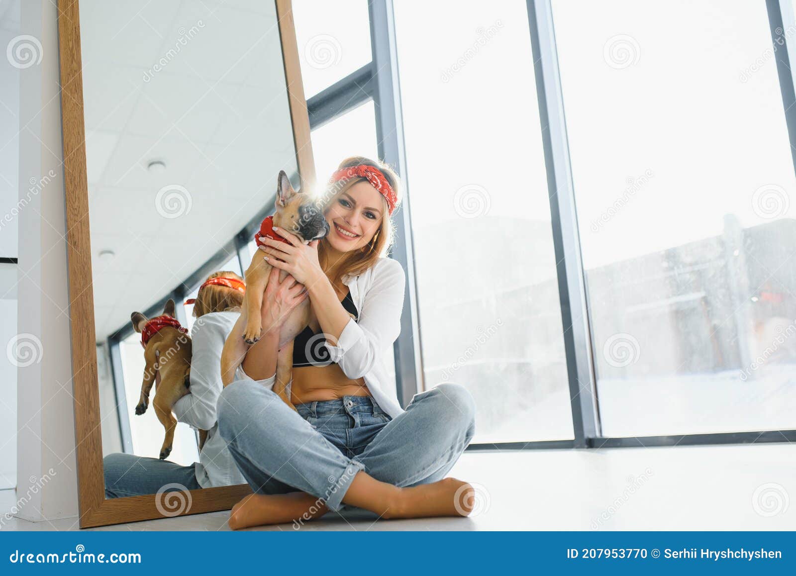 Beautiful Young Blonde Woman Playing with Her Dog at Home, Smiling ... Beautiful Young Blonde Woman Playing with Her Dog at Home, Smiling ...