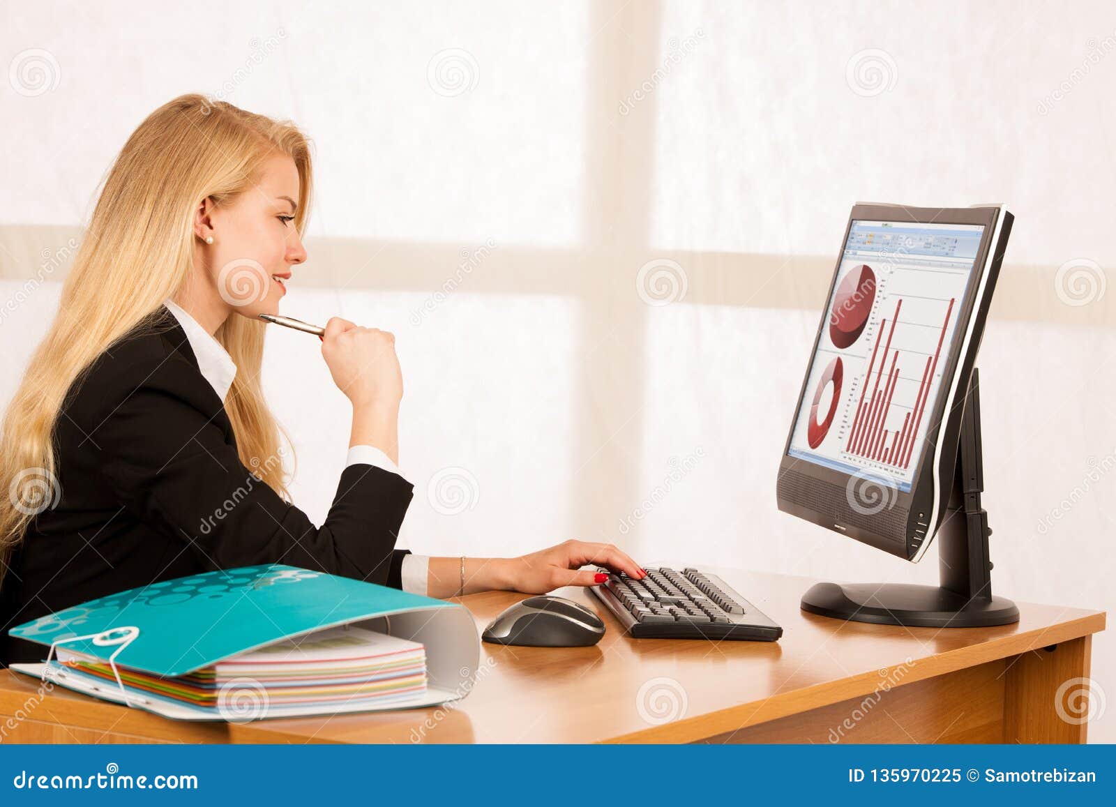 Beautiful Young Blonde Woman Working on Computer in Her Office Stock ...