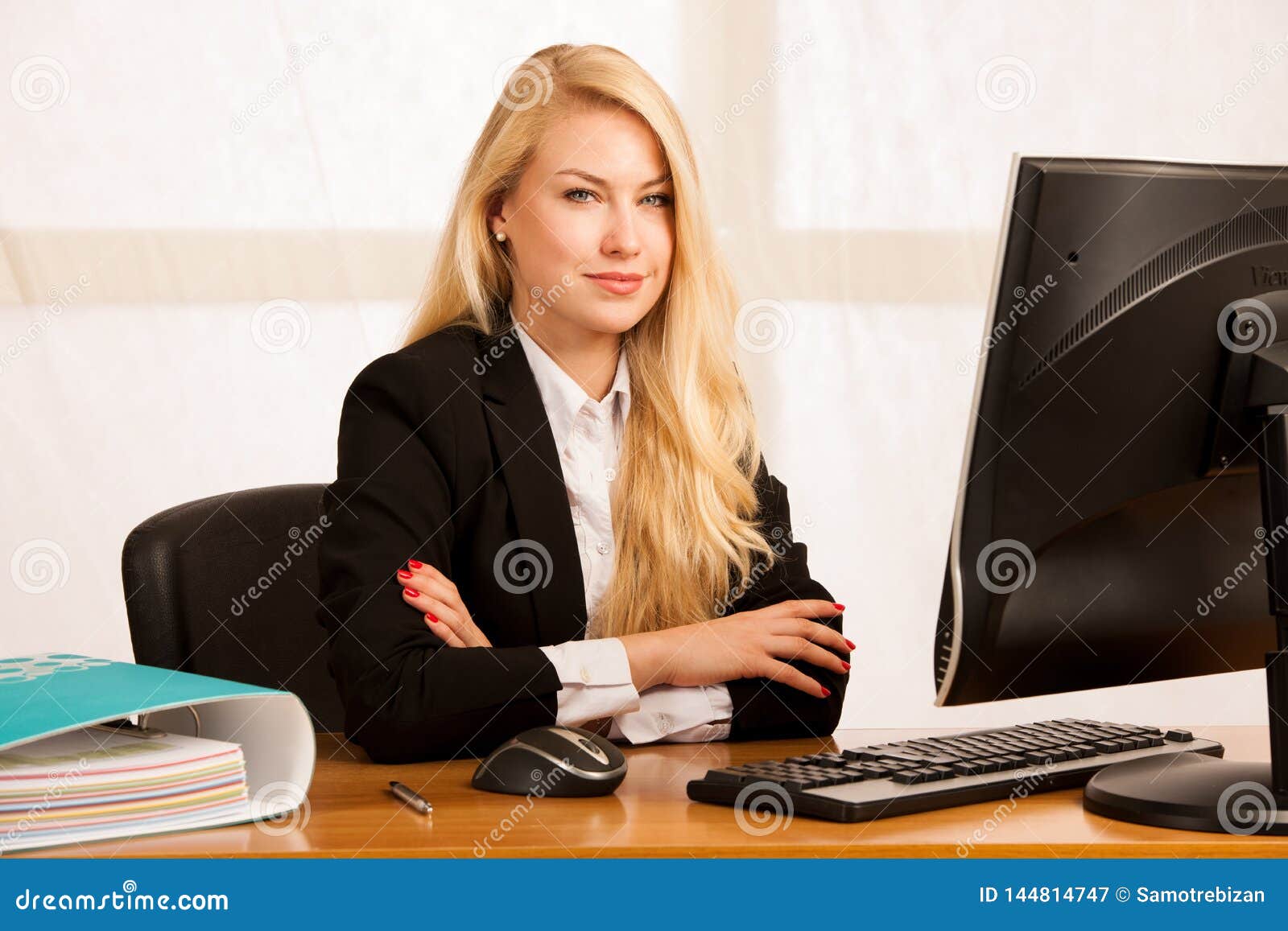 Beautiful Young Blonde Woman Working on Computer in Her Office Stock ...