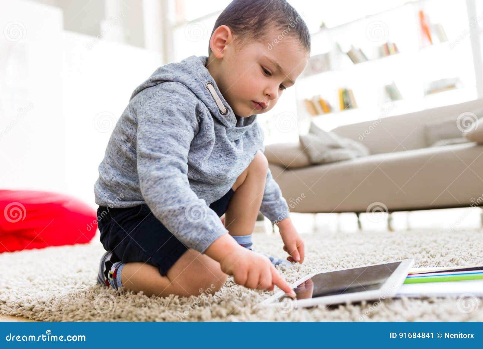 Beautiful Young Boy Using His Digital Tablet at Home. Stock Image ...