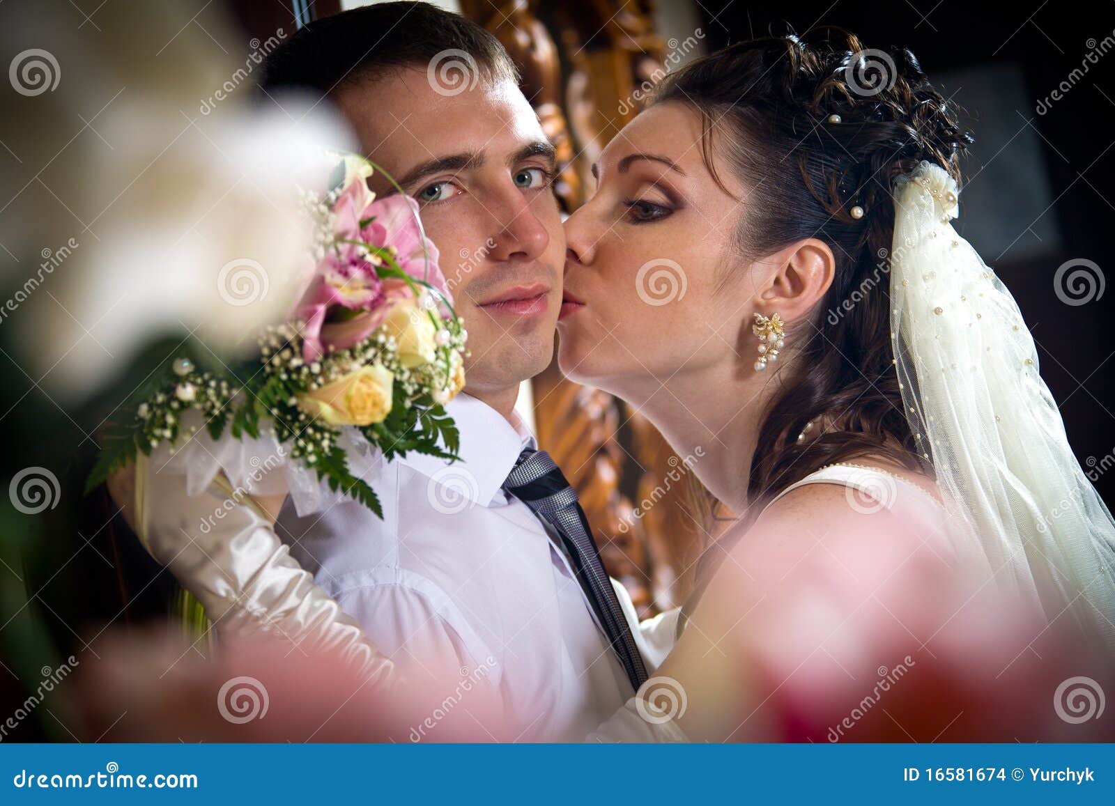 Beautiful Young Bride Kissing Groom Stock Photo - Image of love ...