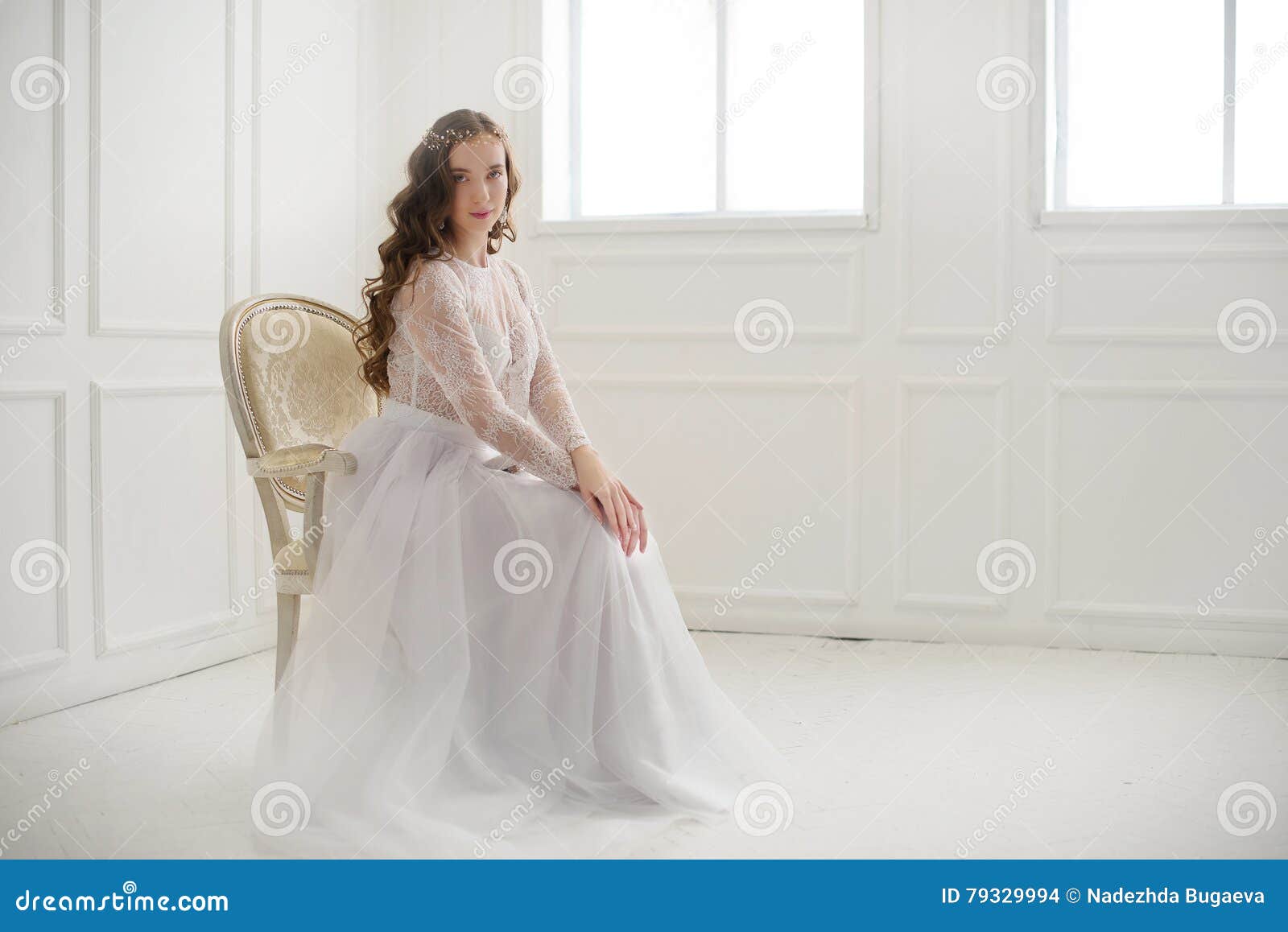Beautiful Young Bride Sitting on a Chair Stock Photo - Image of room ...