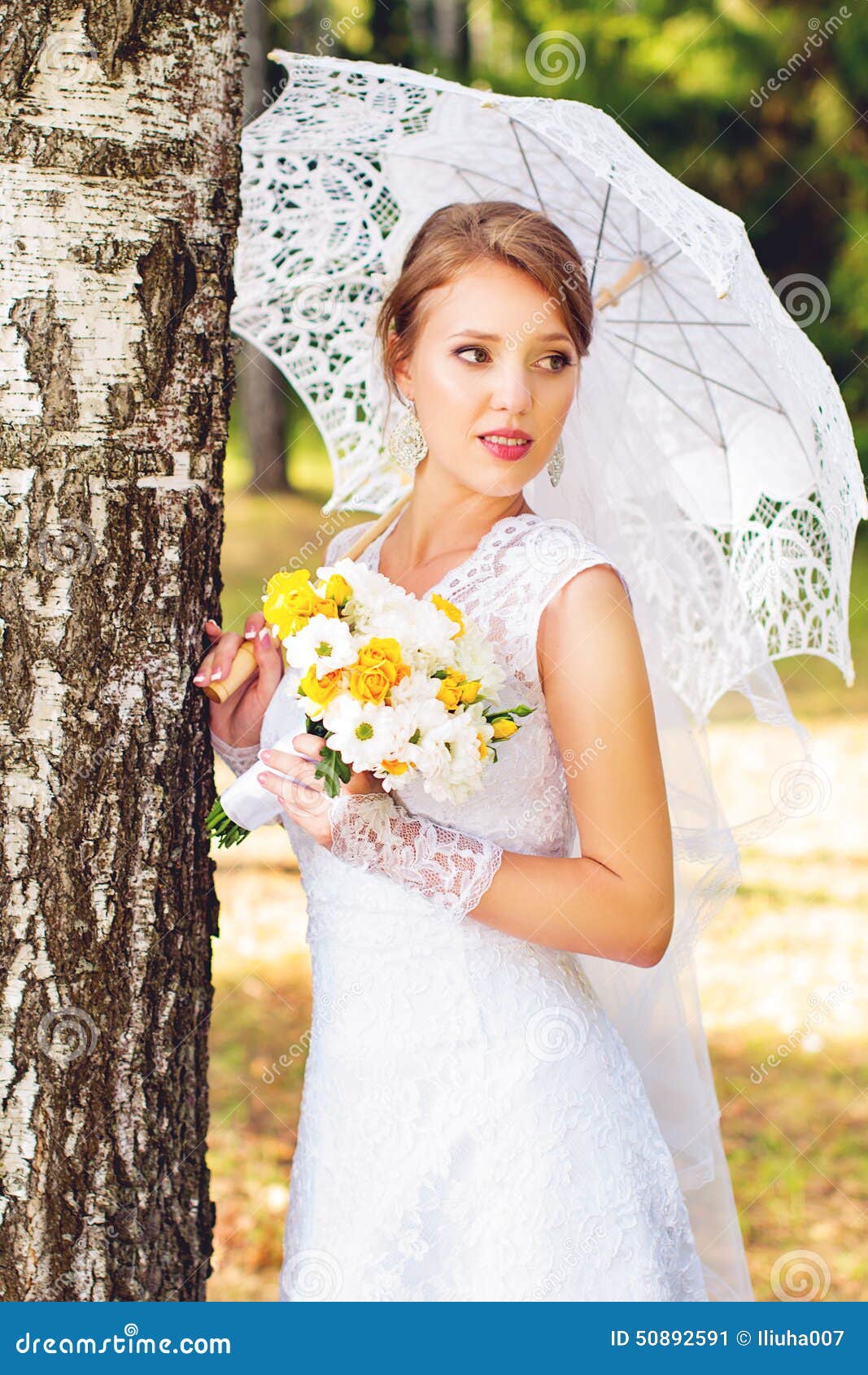 Beautiful Young Bride Standing in the Woods Stock Image - Image of gown ...