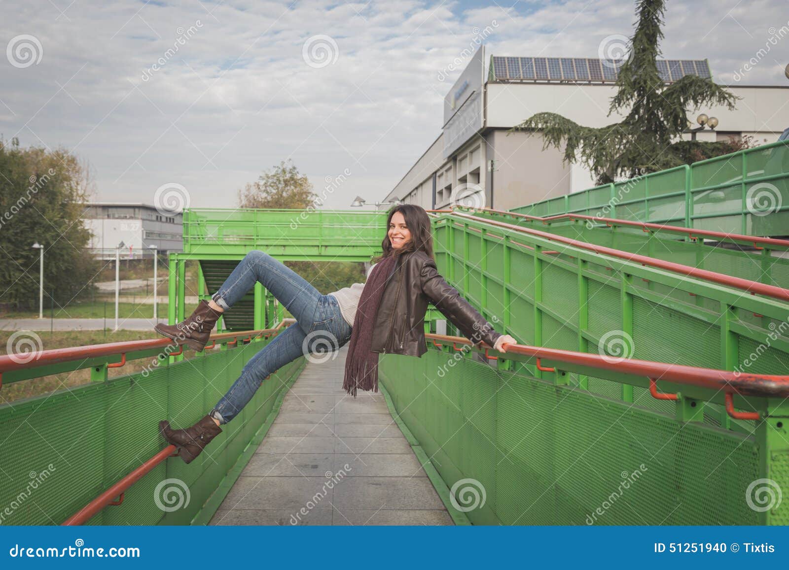 Beautiful Young Brunette Posing on a Bridge Stock Photo - Image of ...