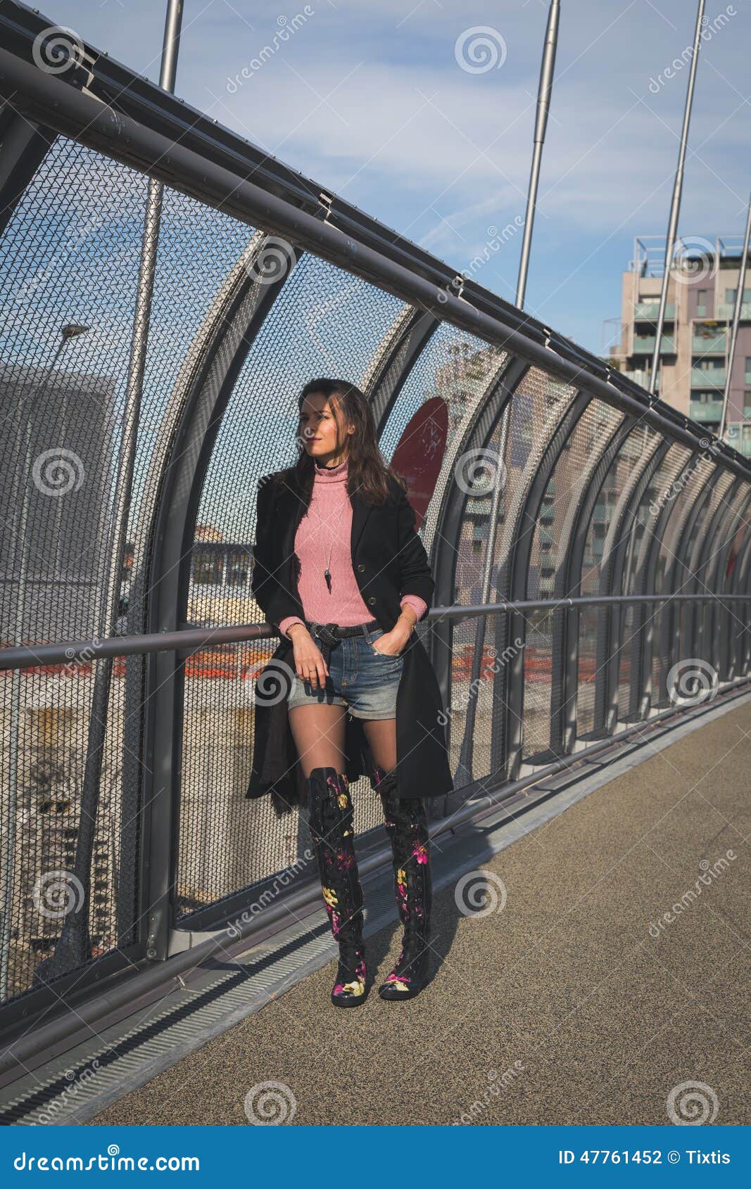 Beautiful Young Brunette Posing on a Bridge Stock Photo - Image of knee ...