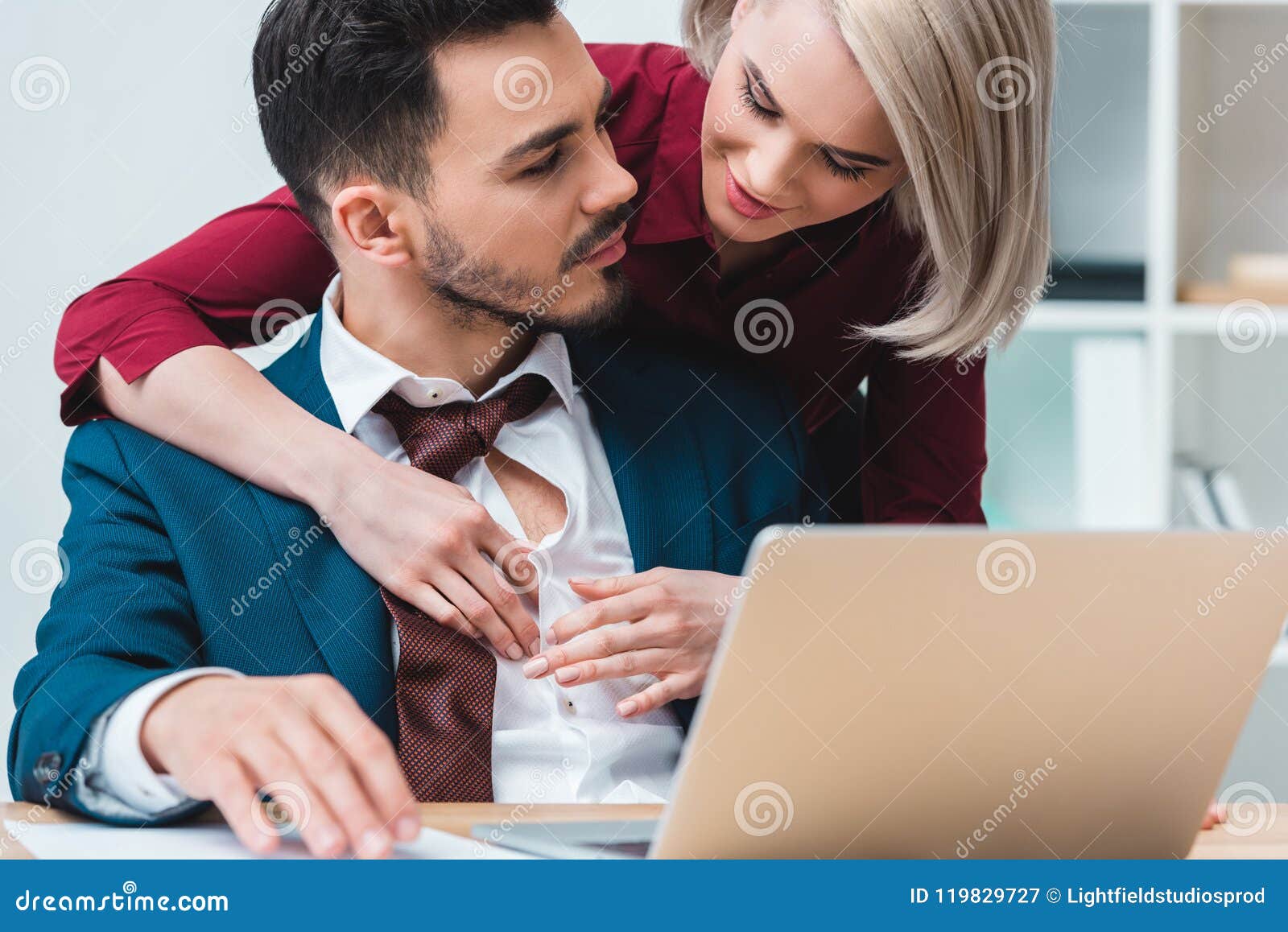 Beautiful Young Business Colleagues Flirting while Working Together ... Beautiful Young Business Colleagues Flirting while Working Together ...