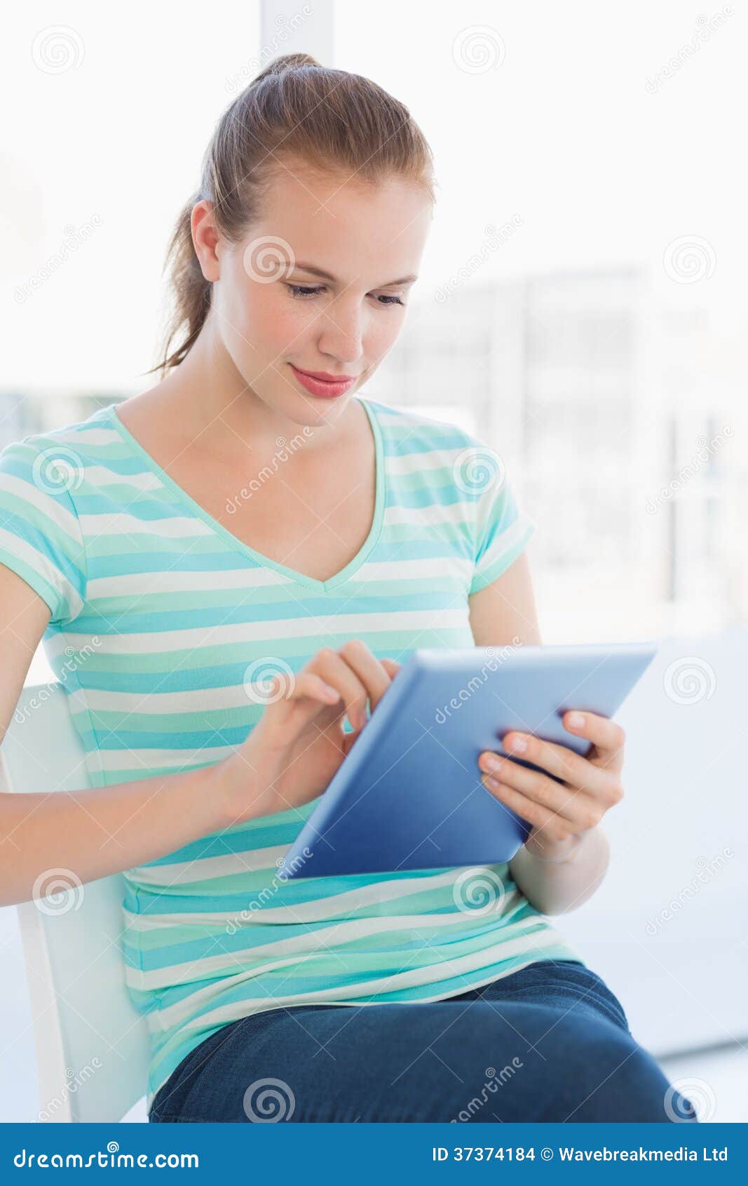 Beautiful Young Casual Woman Using Digital Tablet Stock Photo - Image ...