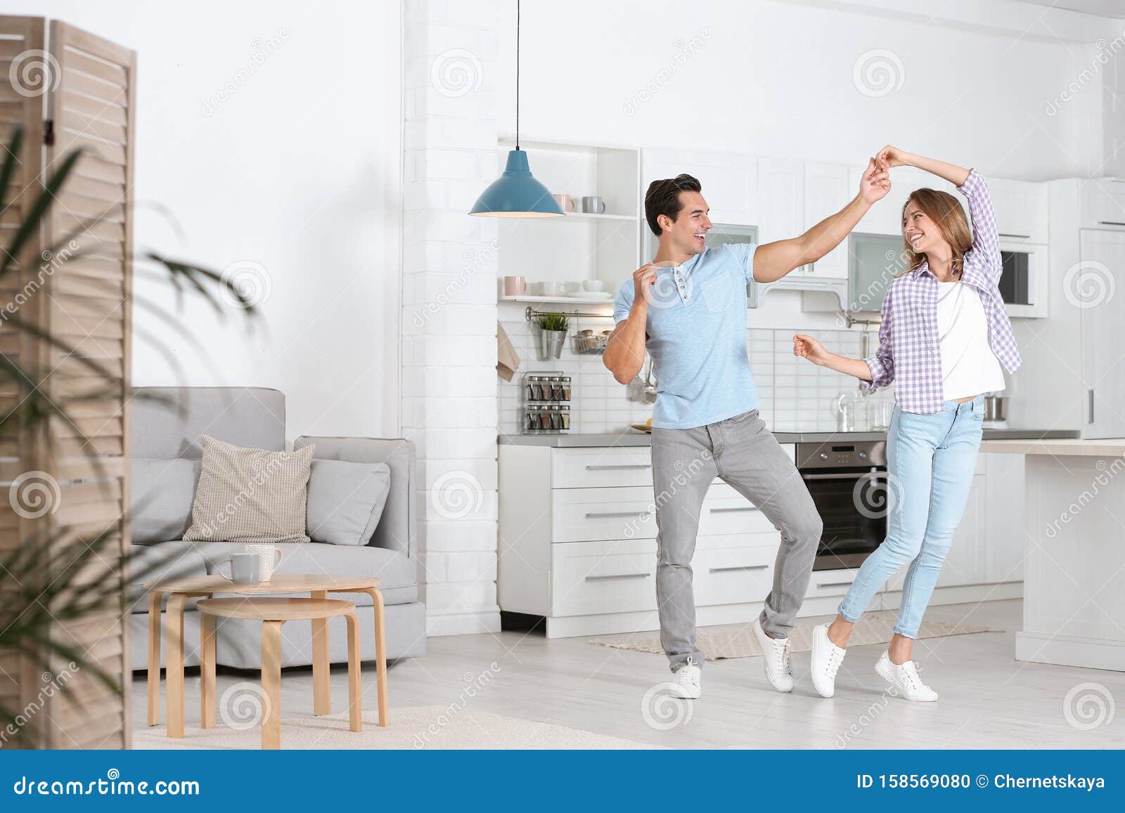 Beautiful Young Couple Dancing in Kitchen Stock Photo - Image of model ...