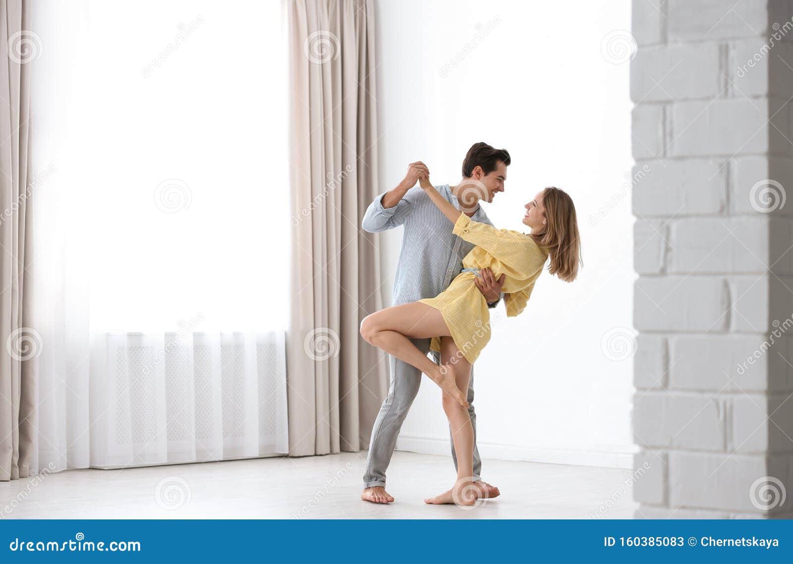 Beautiful Young Couple Dancing in Room Stock Image - Image of disco ...