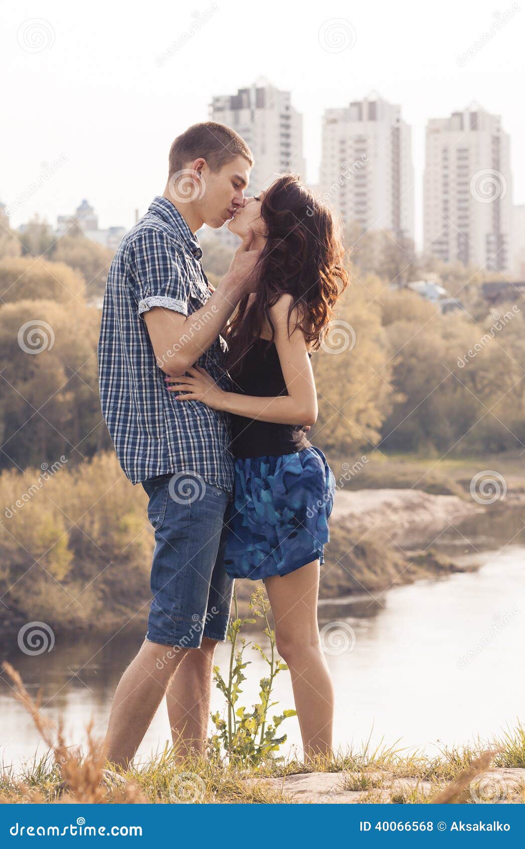 Beautiful Young Couple Kissing Stock Photo - Image of kissing, love ...