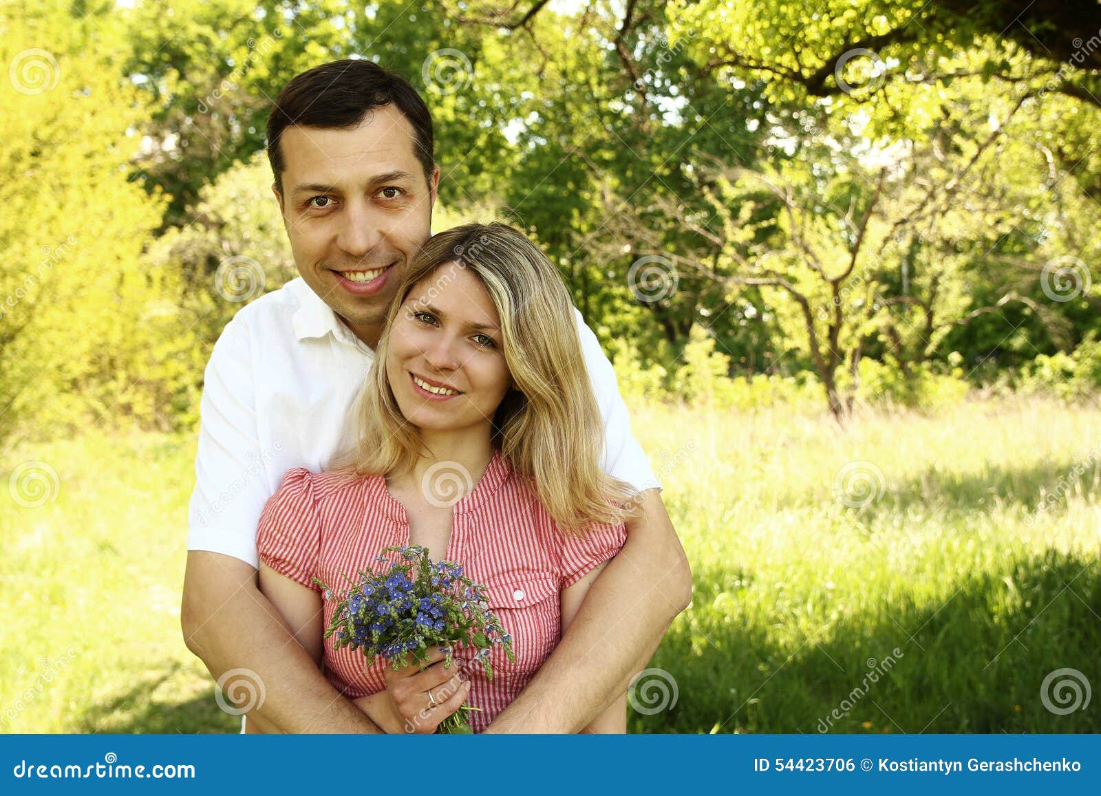 Beautiful Young Couple in Love in Nature Stock Photo - Image of holding ...