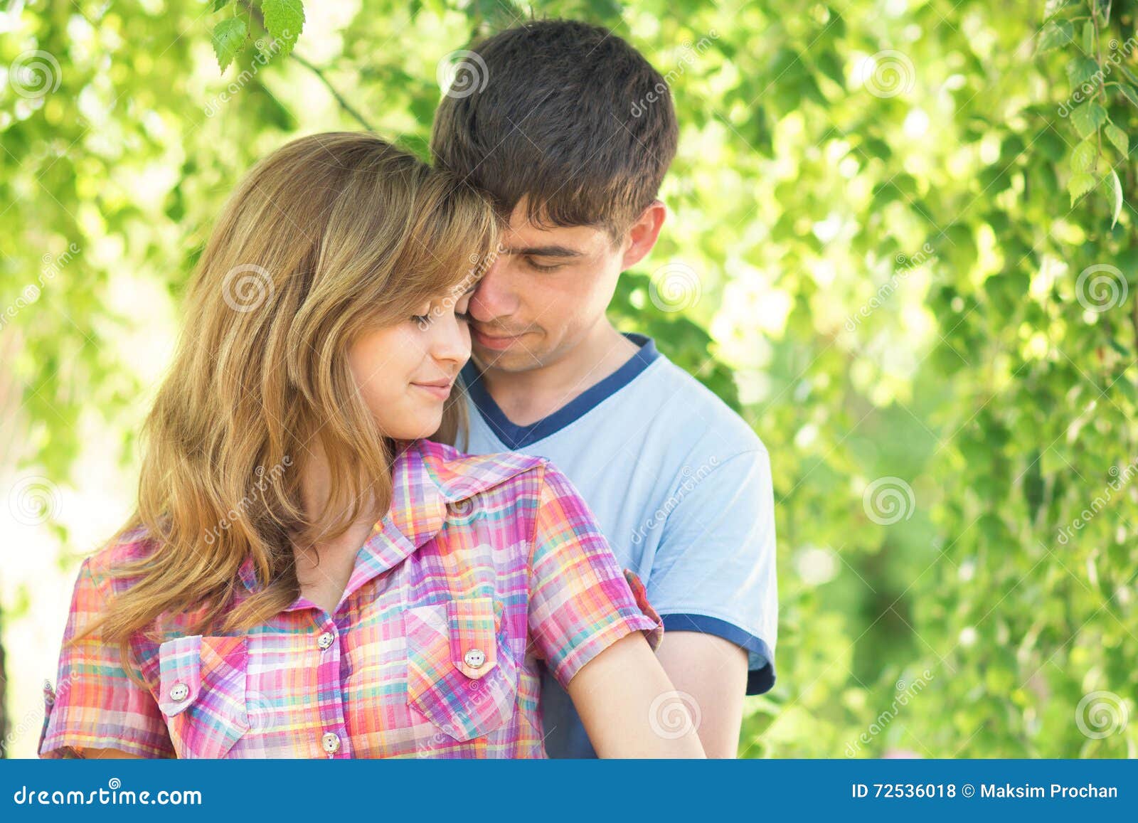 Beautiful Young Couple in Nature Stock Photo - Image of girl, privacy ...