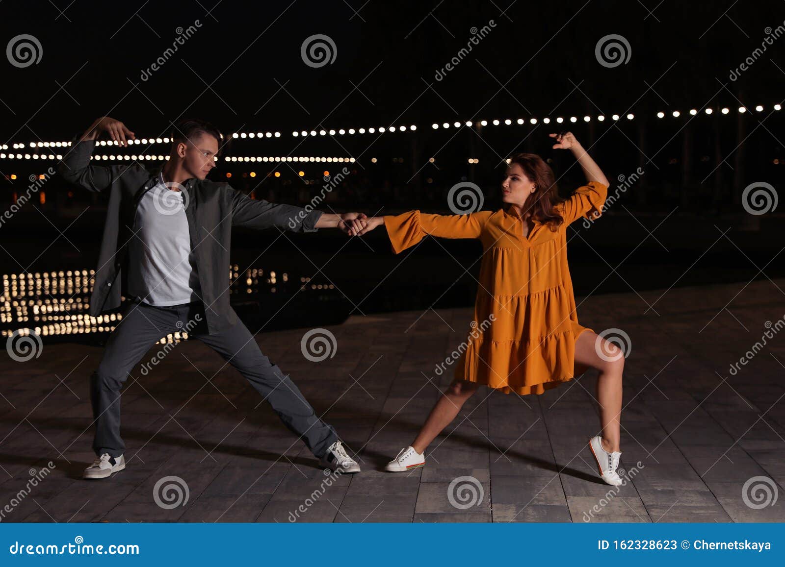 Beautiful Young Couple Practicing Dance Moves in Evening Stock Image ...