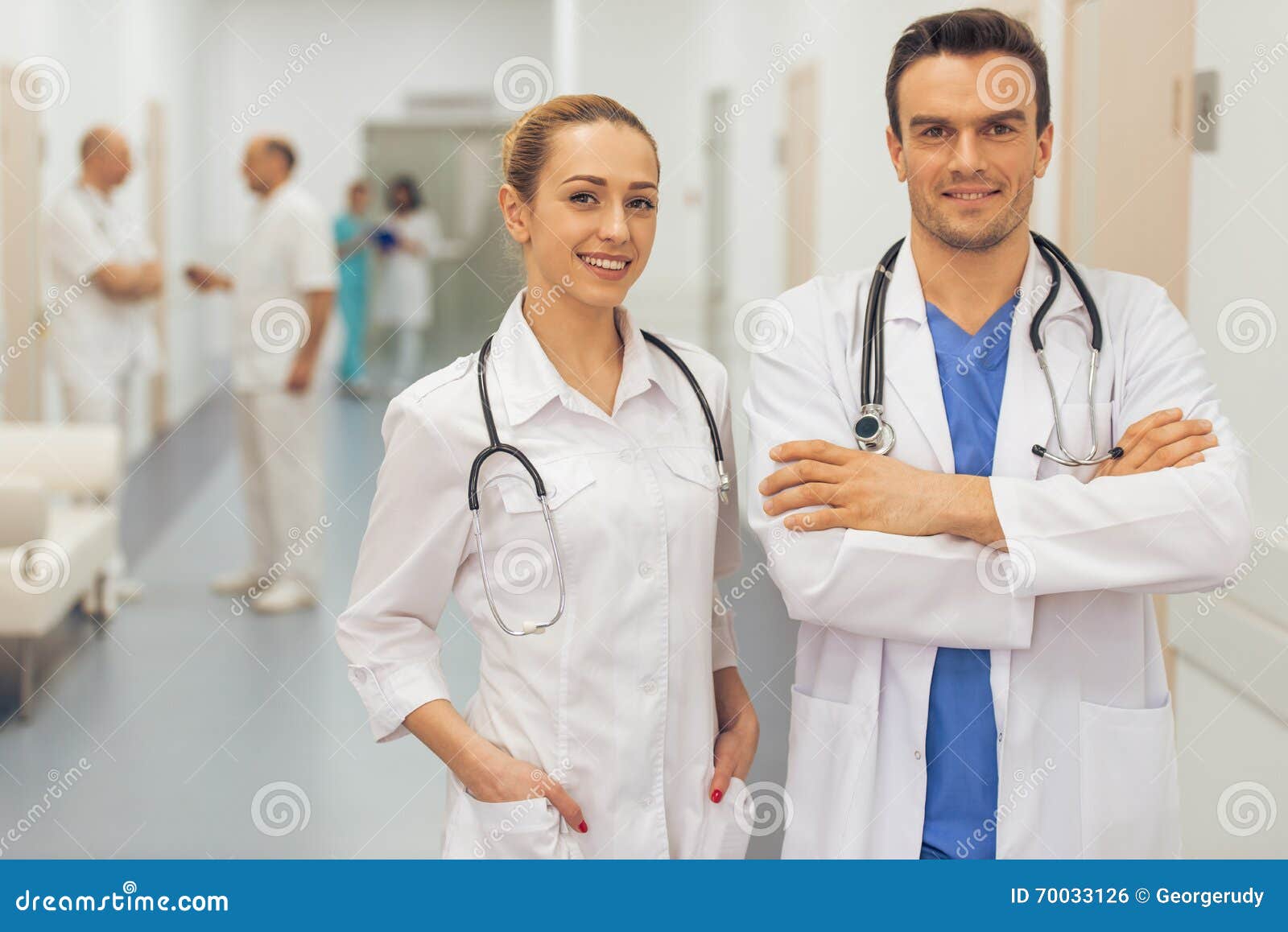 Beautiful young doctors stock photo. Image of beautiful - 70033126