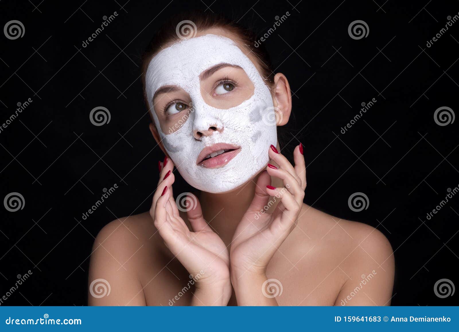 Beautiful Young European Woman Apply Clay Mask On Her Face Beauty Spa
