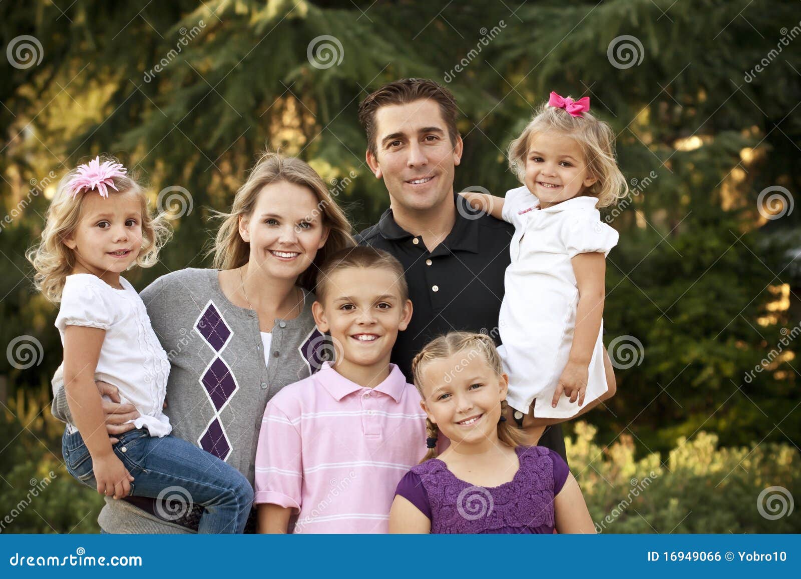 Beautiful Young Family Portrait Stock Photo - Image of attractive ...