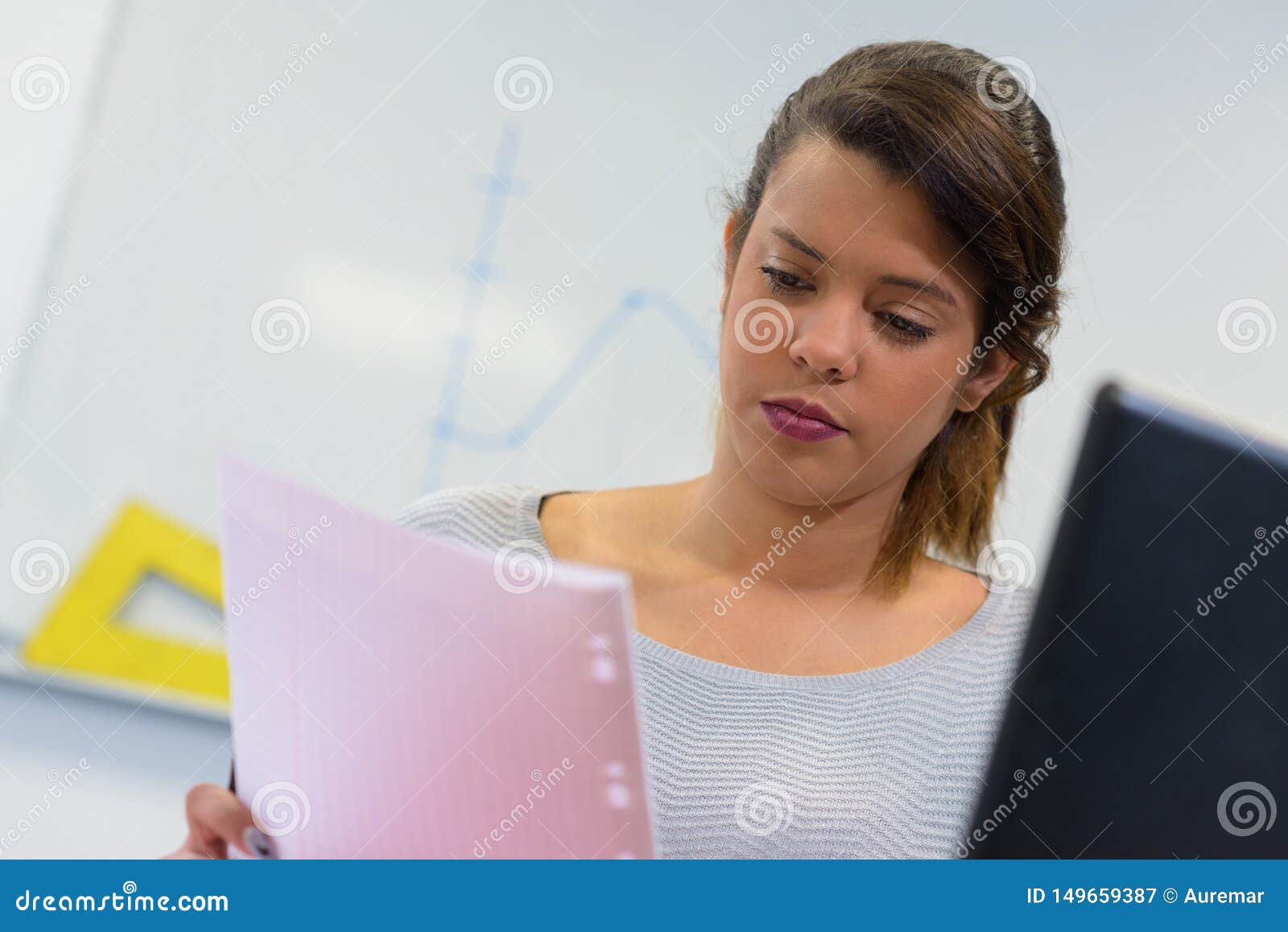 The Teacher Of Physics Explains Concept Of Electromagnetic Induction ...